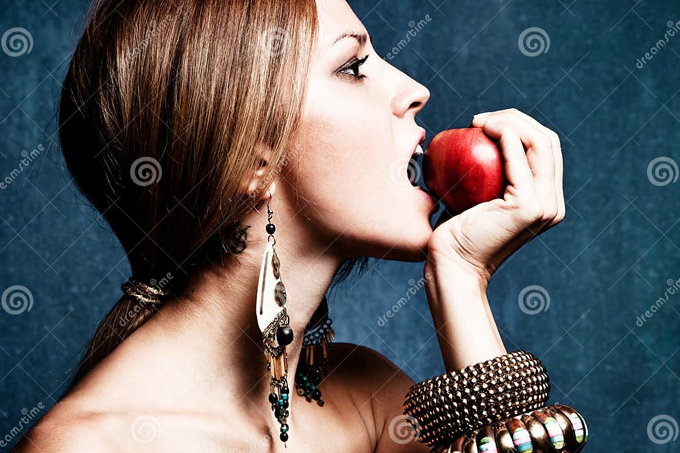 Bite an apple stock photo. Image of hold, young, oriental - 22018924