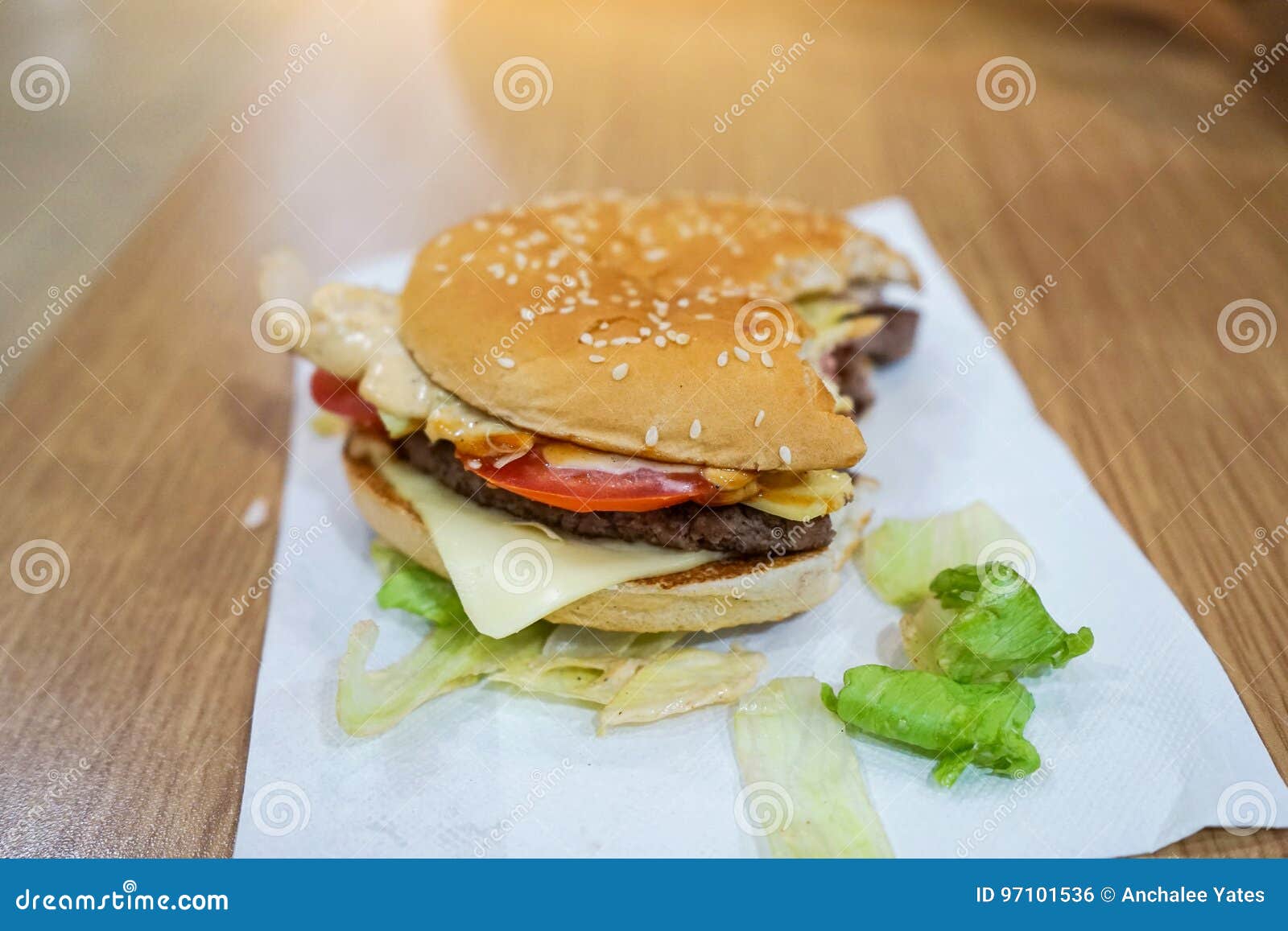 Bite Beef Burger on the Table in a Restaurant Stock Photo - Image of ...