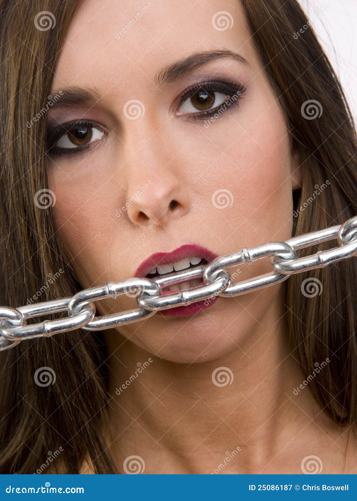 Beautiful Brunette Woman Appears To Bite the Chain Stock Image - Image ...