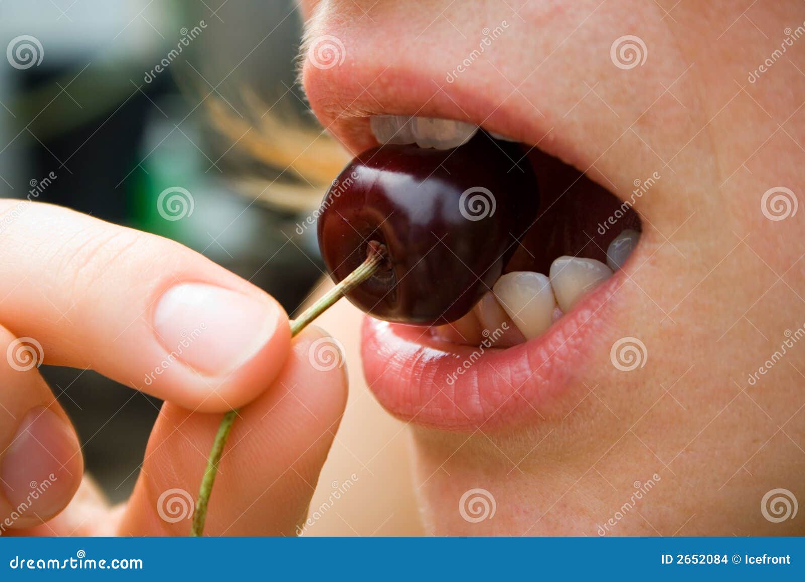 A bite of cherry stock photo. Image of woman, bite, juicy - 2652084