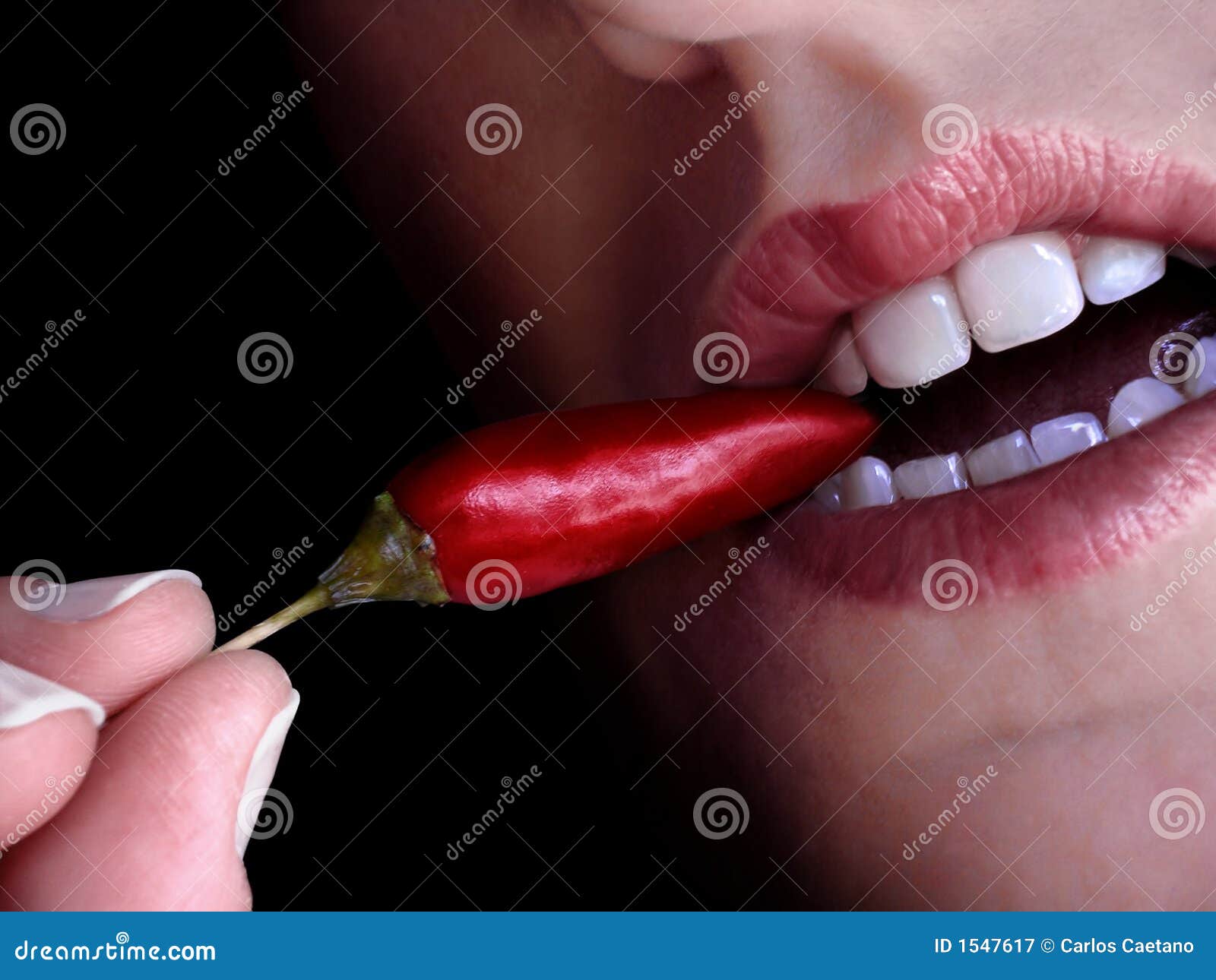 Beautiful Womans Mouth Biting Red Chili Pepper Stock Photos - Free ...