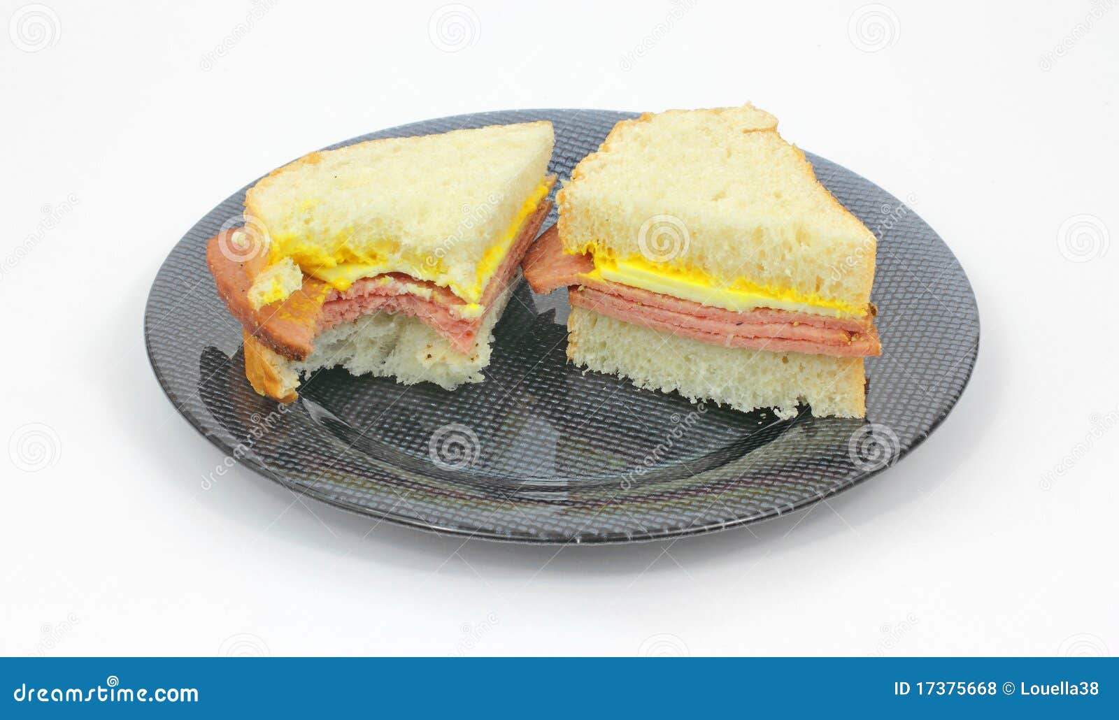 Bite Turkey Pastrami Sandwich on Blue Plate Stock Photo - Image of ...