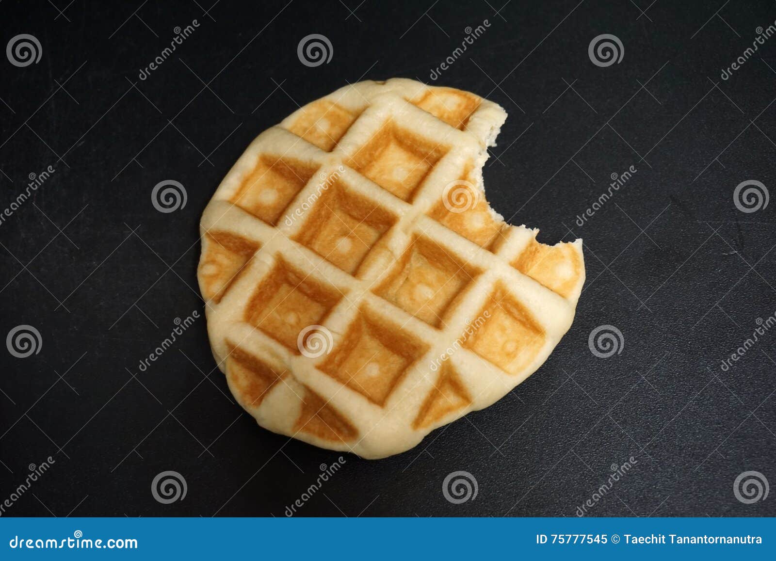 Bite of waffle stock image. Image of thin, food, sweet - 75777545