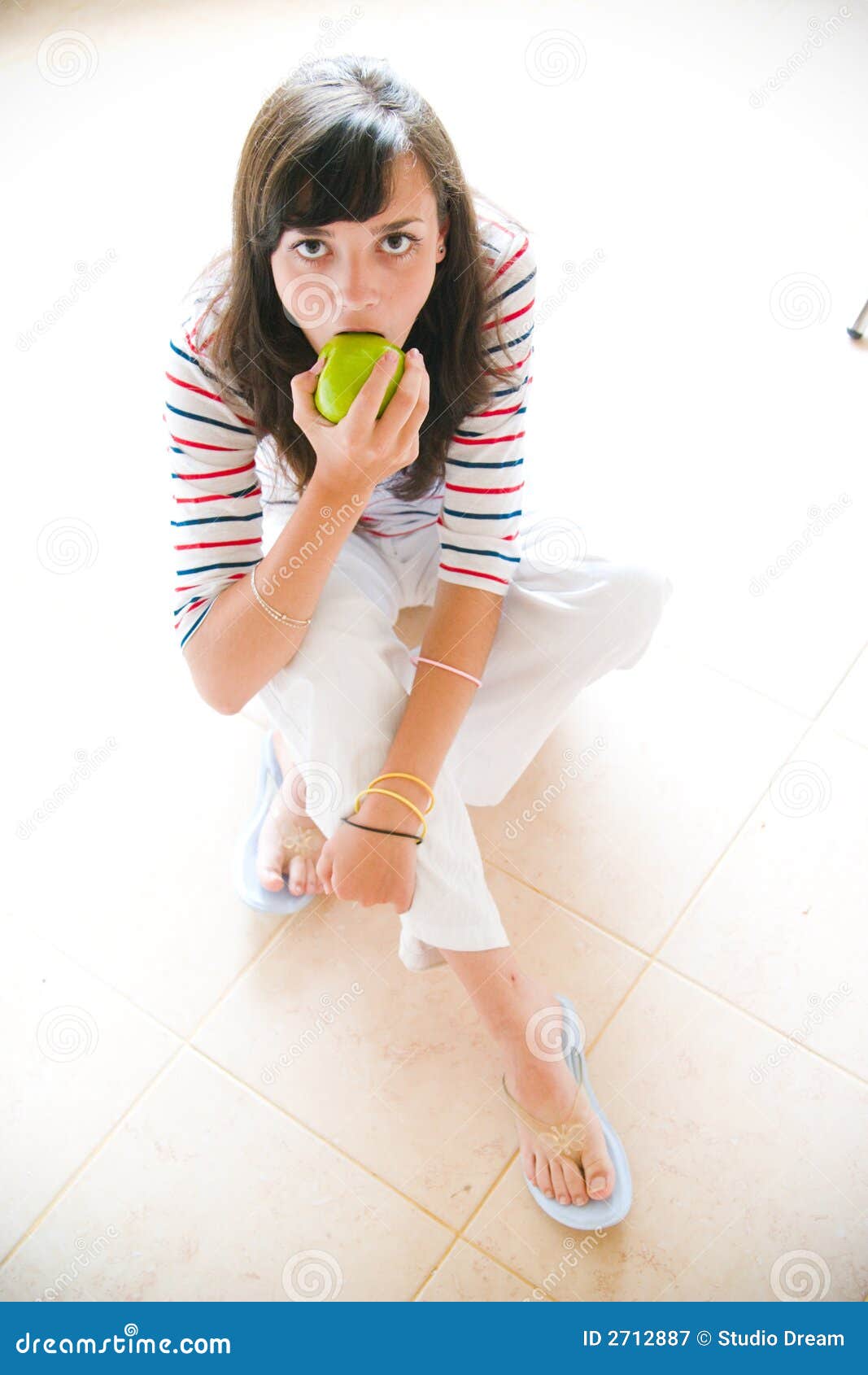 Biting into an apple stock image. Image of dietary, woman - 2712887