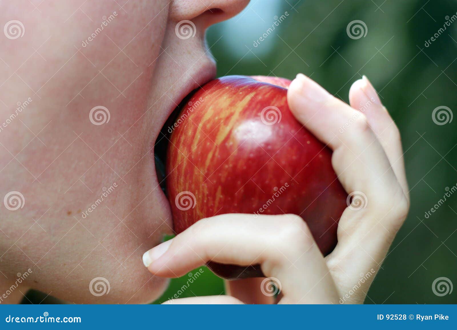 Biting apple stock photo. Image of crunchy, fruit, food - 92528