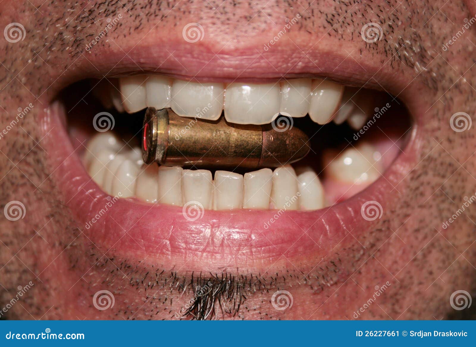 Biting a bullet stock image. Image of experience, provocative - 26227661