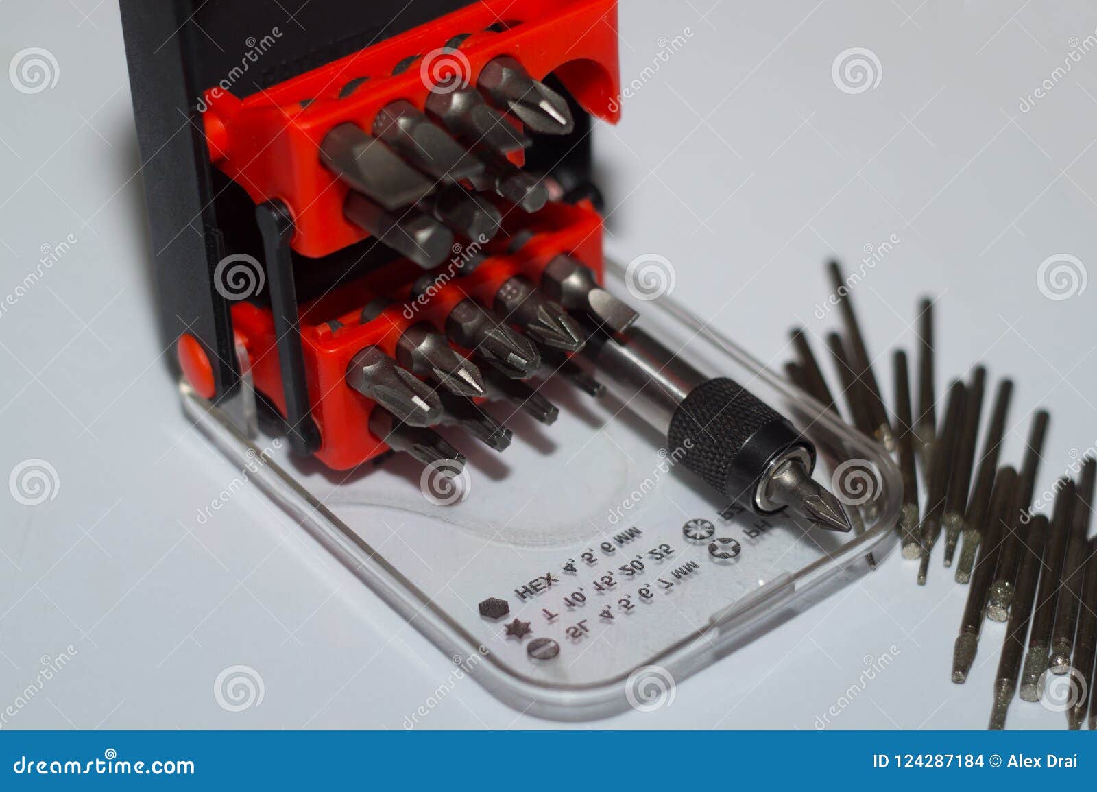 Bits Holder in Box and Many Tool Bits on White Background. Close-up ...