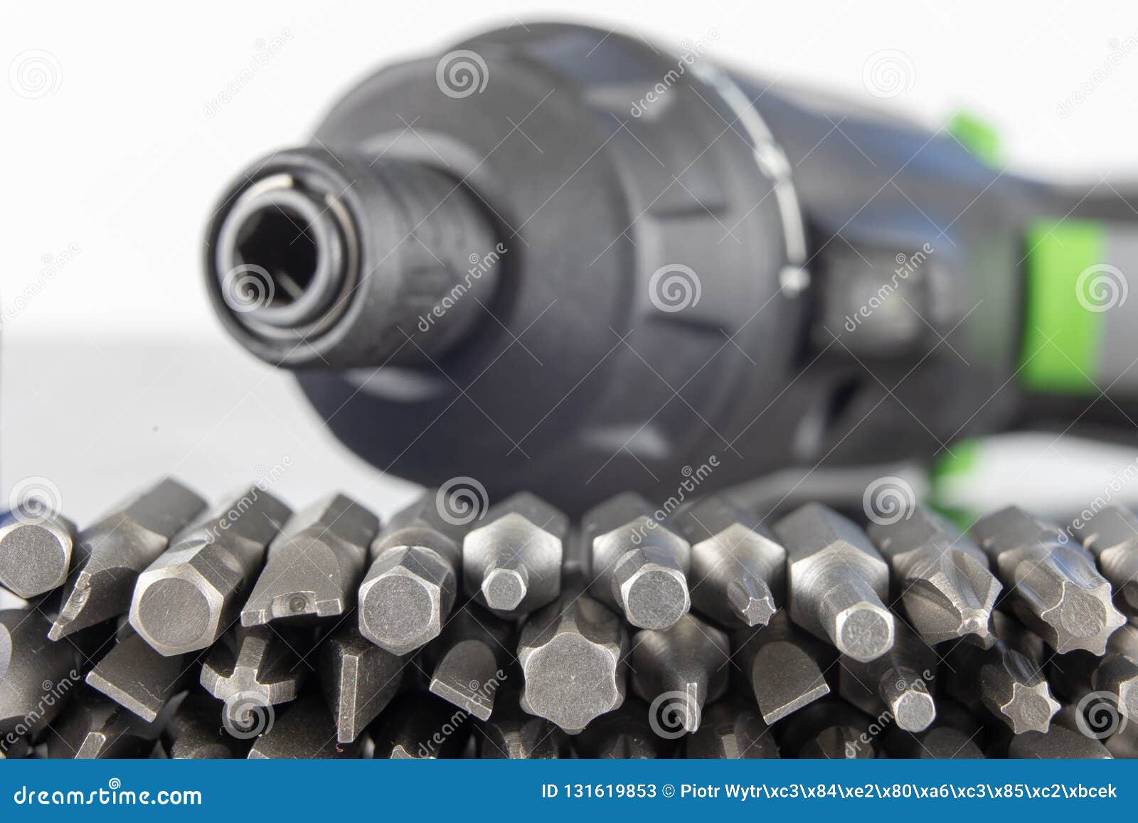 Bits for a Screwdriver on a Metal Workshop Table. Workshop Accessories ...