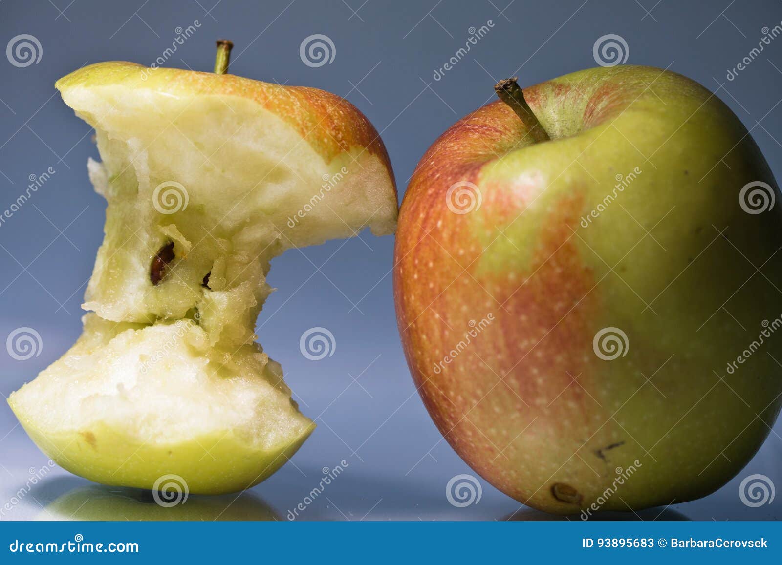 Bitten Apple with Sad Face Expression beside Happy Whole Fresh Apple ...