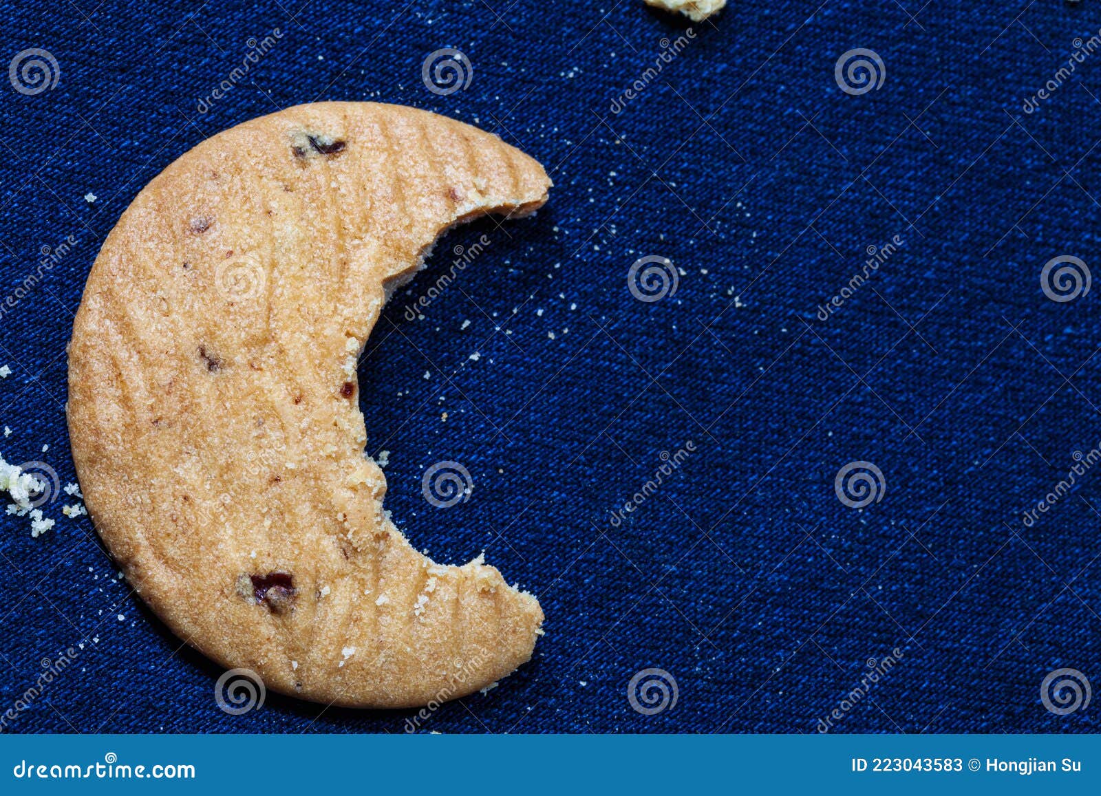 Bitten, Broken, Cookie Crumbs. Cookies on Blue Cloth Stock Image ...