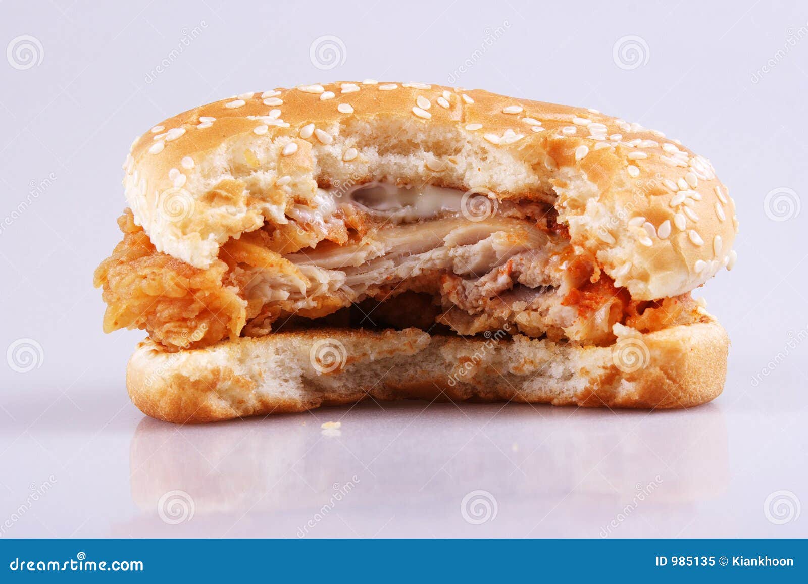 Bitten burger stock image. Image of bite, isolated, eaten - 985135