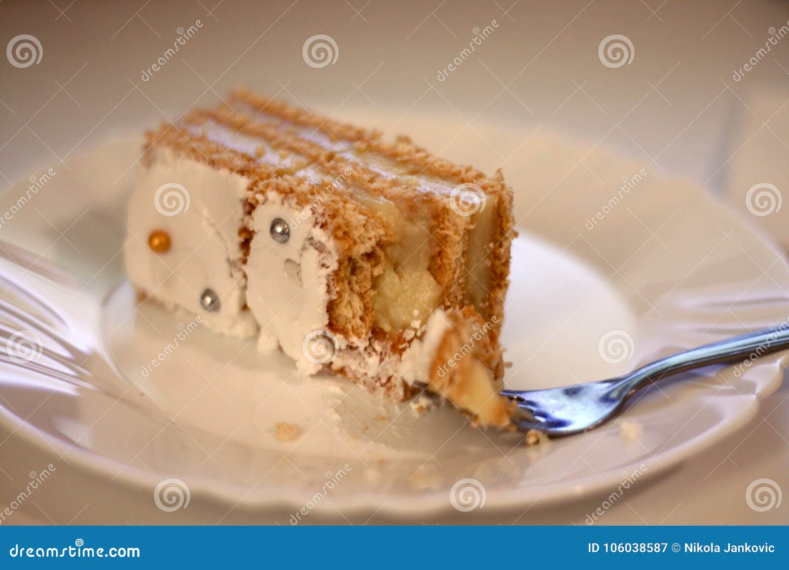Bitten cake on plate stock image. Image of slice, sweet - 106038587