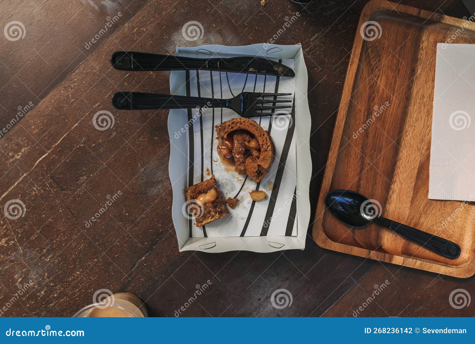Bitten Cake Served in Paper Box in the Coffee Cafe. Stock Photo - Image ...