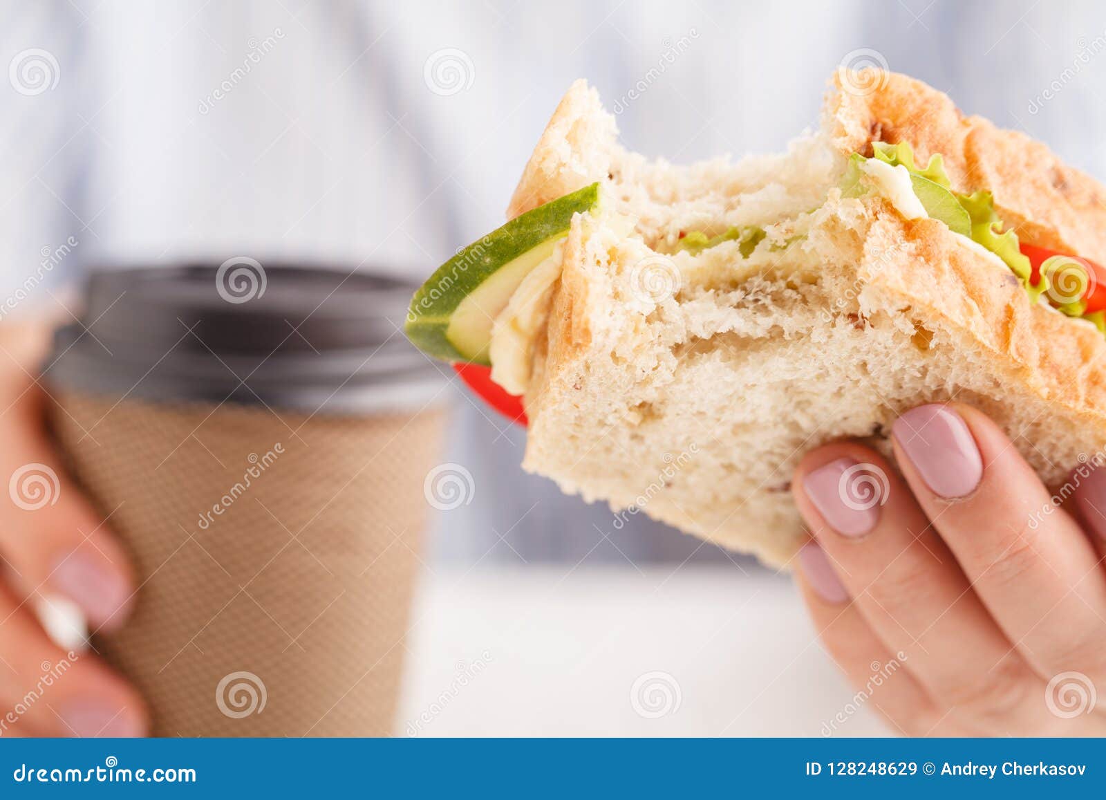 Bitten Cheese and Lettuce Sandwich in Hand, Whole Sandwich Stock Image ...