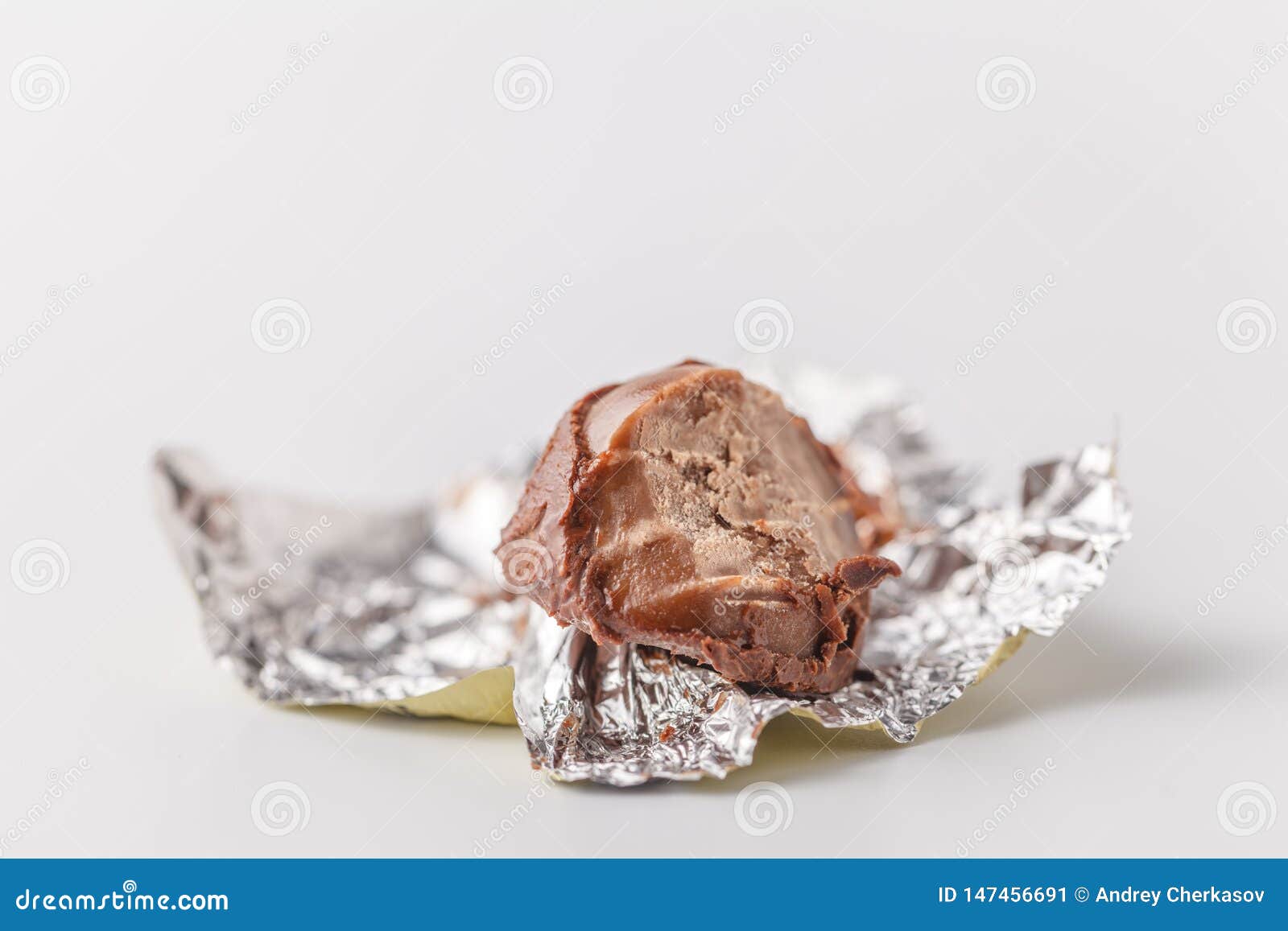 Bitten Chocolate Candy in a Candy Wrapper Stock Image - Image of sweet ...
