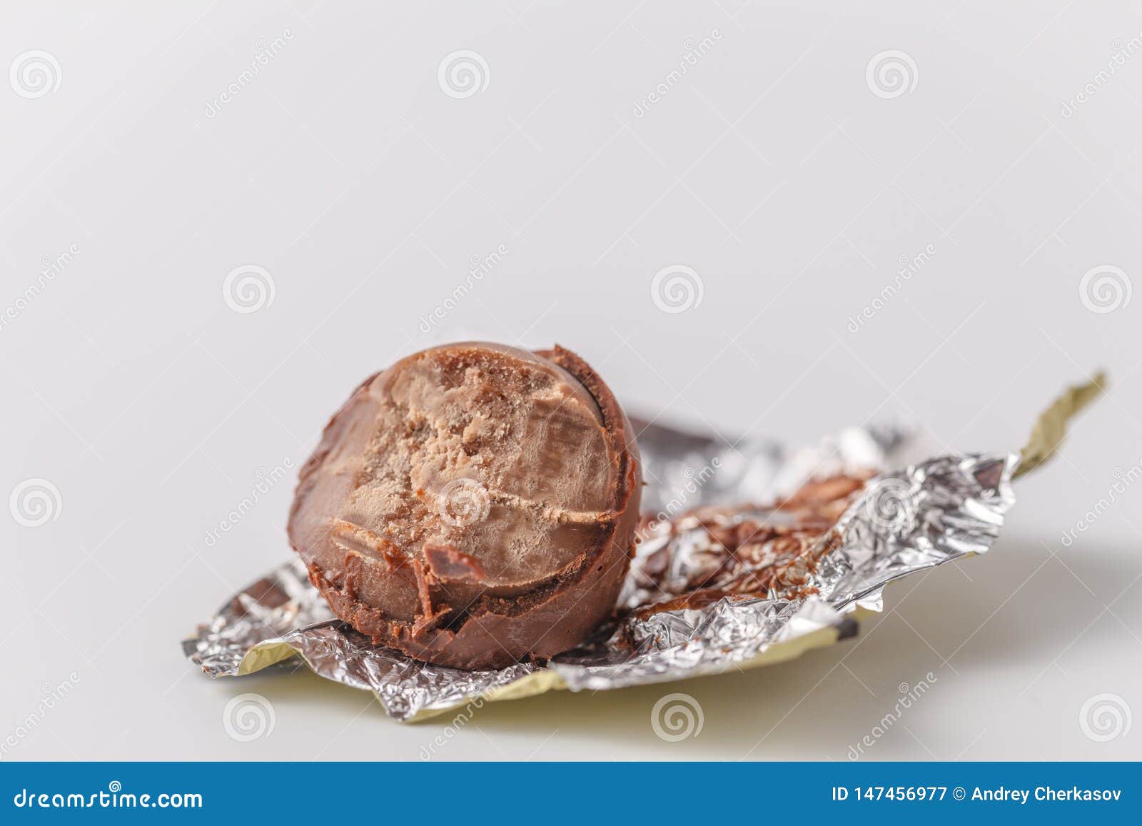 Bitten Chocolate Candy in a Candy Wrapper Stock Image - Image of sugary ...