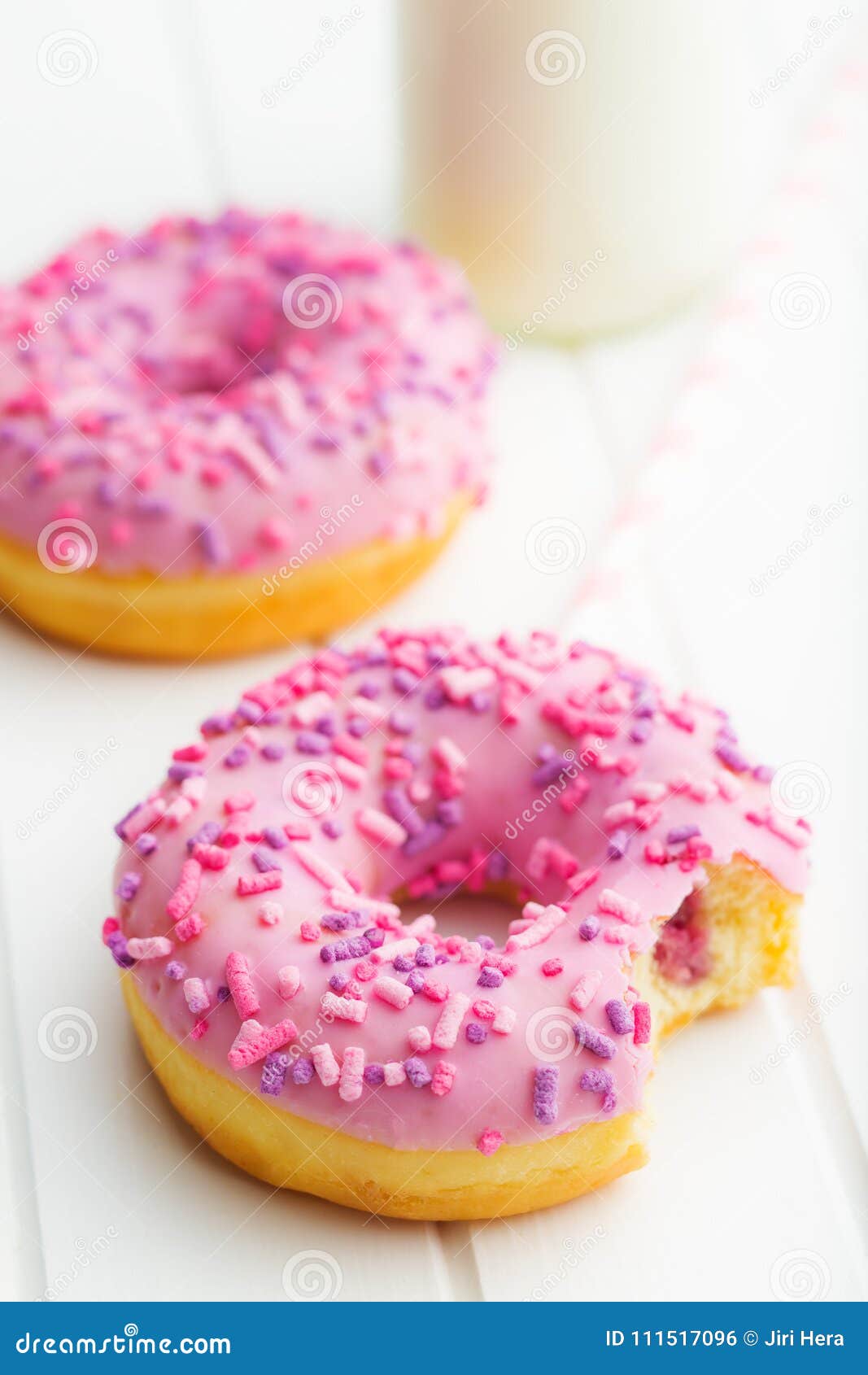 A bitten donut. stock photo. Image of doughnut, bitten - 111517096