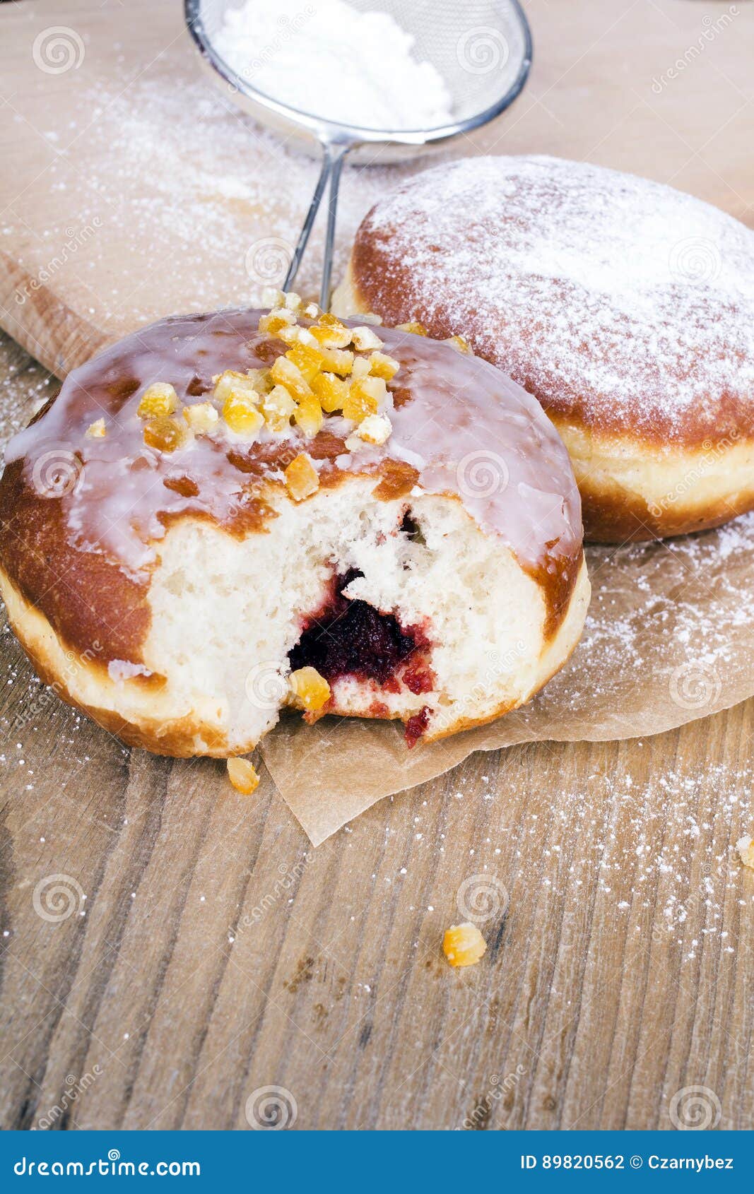 Bitten Donut on a Wooden Table Stock Photo - Image of glazed, bitten ...