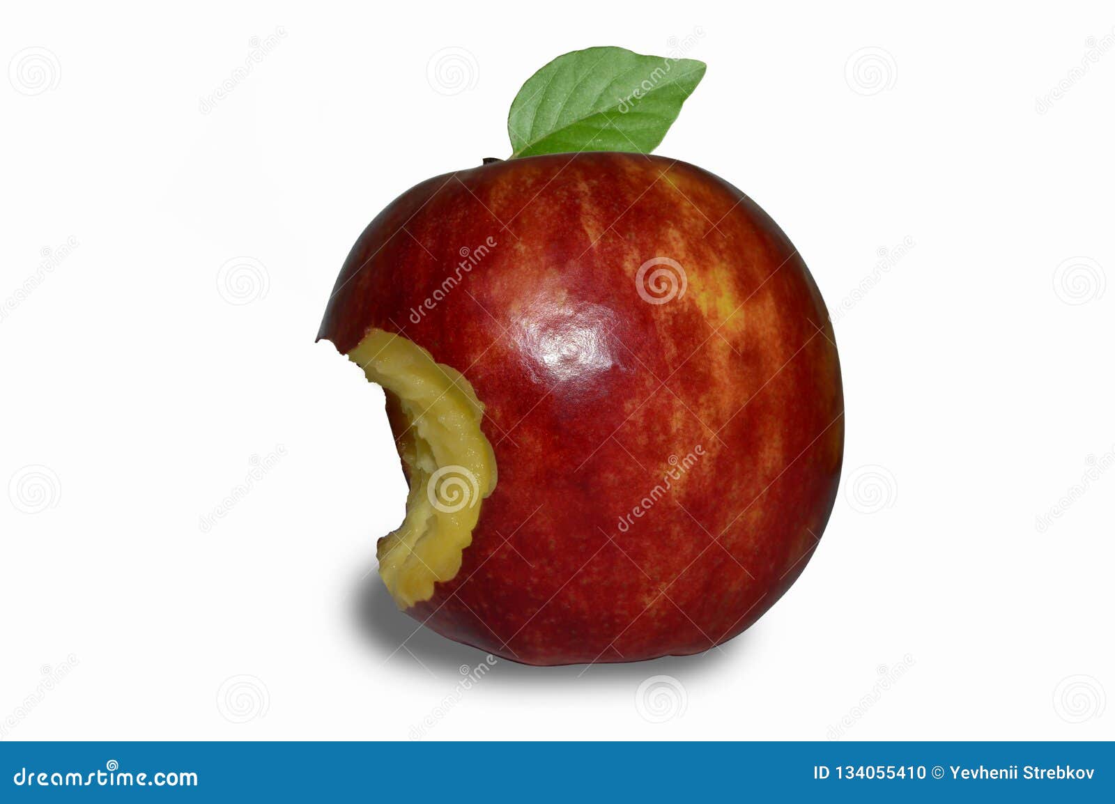 Bitten Red Apple With Green Leaf On White Background Stock Photo ...