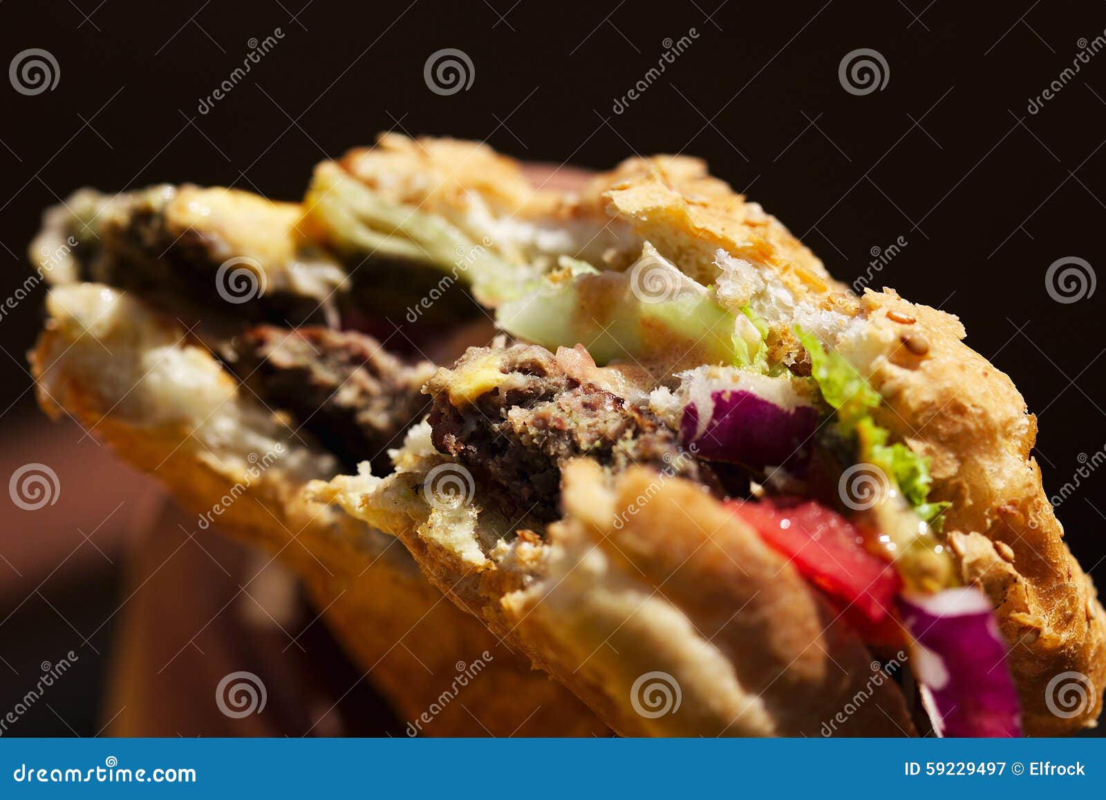 Bitten tasty burger stock image. Image of classic, lunch - 59229497