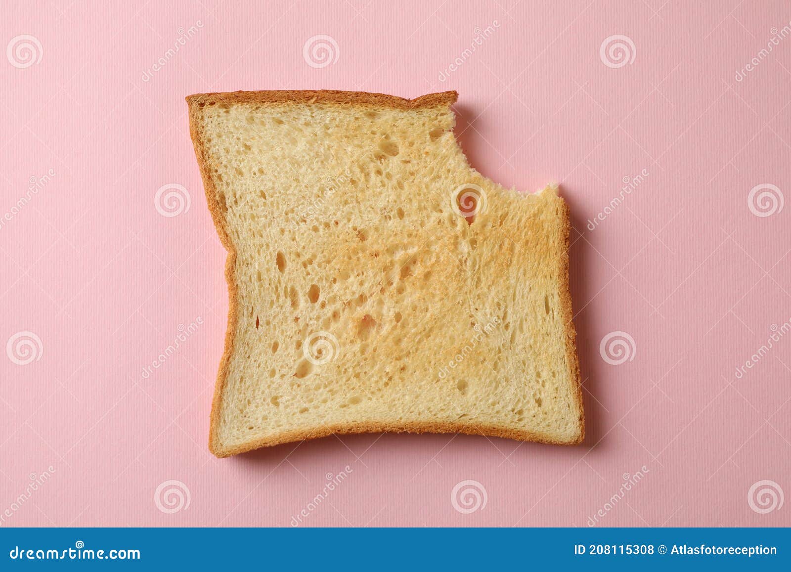 Bitten Toast Bread on Pink Background, Close Up Stock Photo - Image of ...