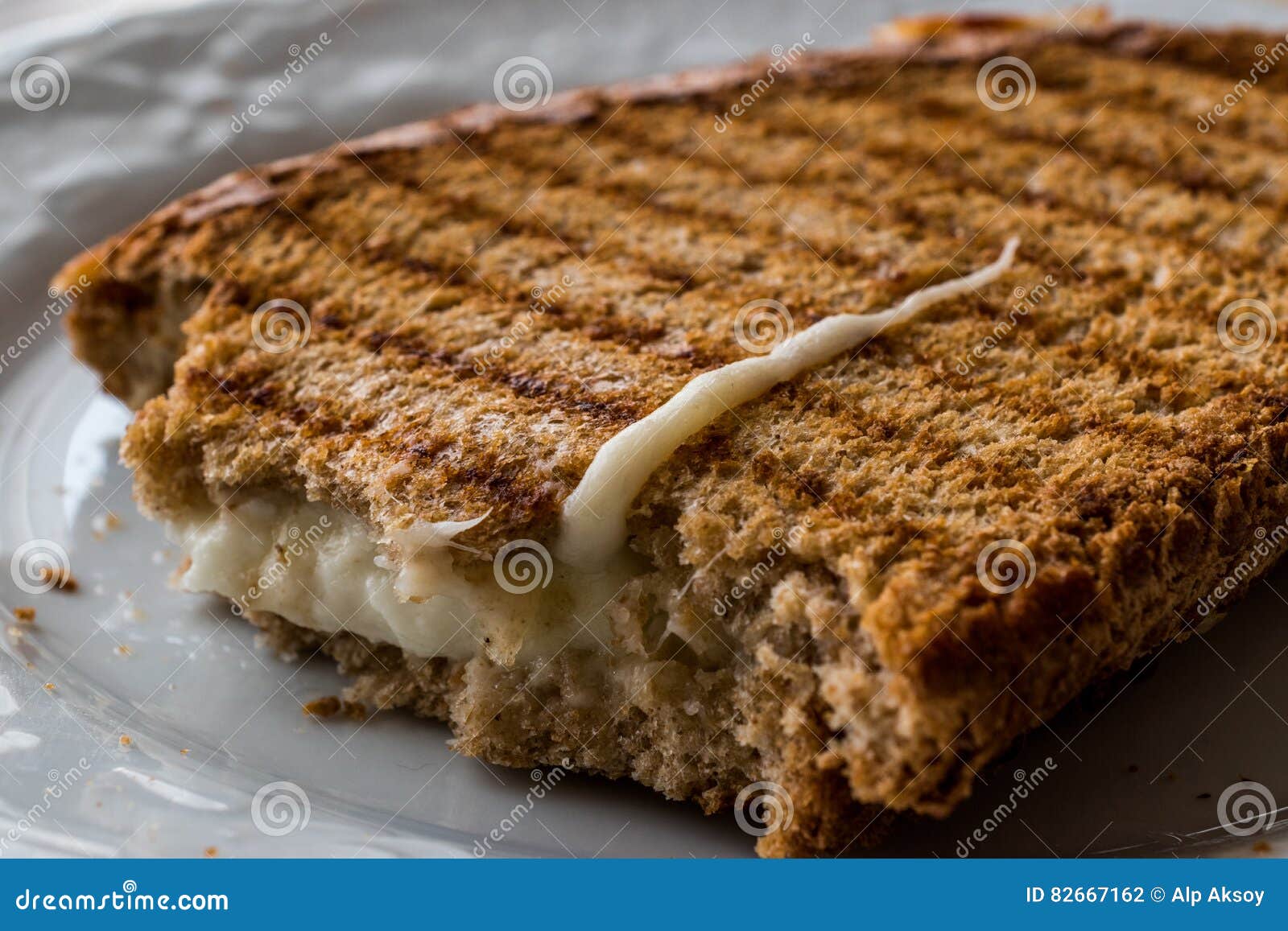 Bitten Turkish Toast with Cheddar Cheese Stock Photo - Image of ayvalik ...