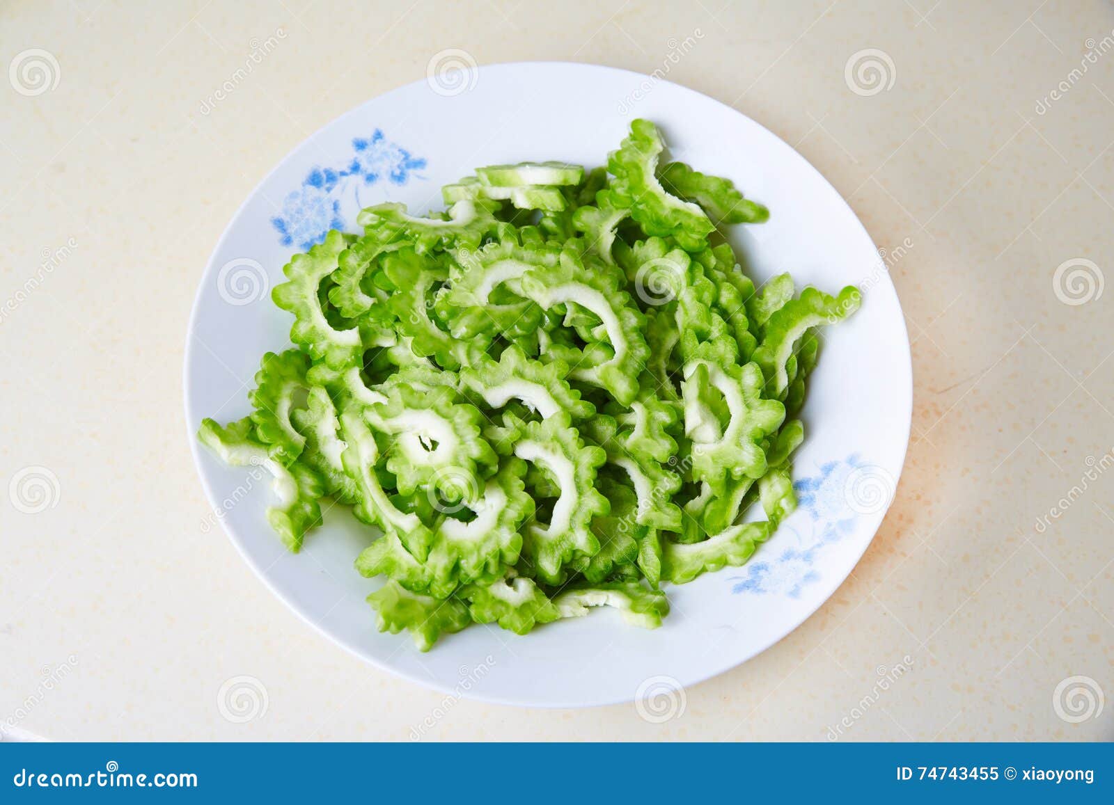 Bitter gourd slices stock image. Image of plate, bitter - 74743455