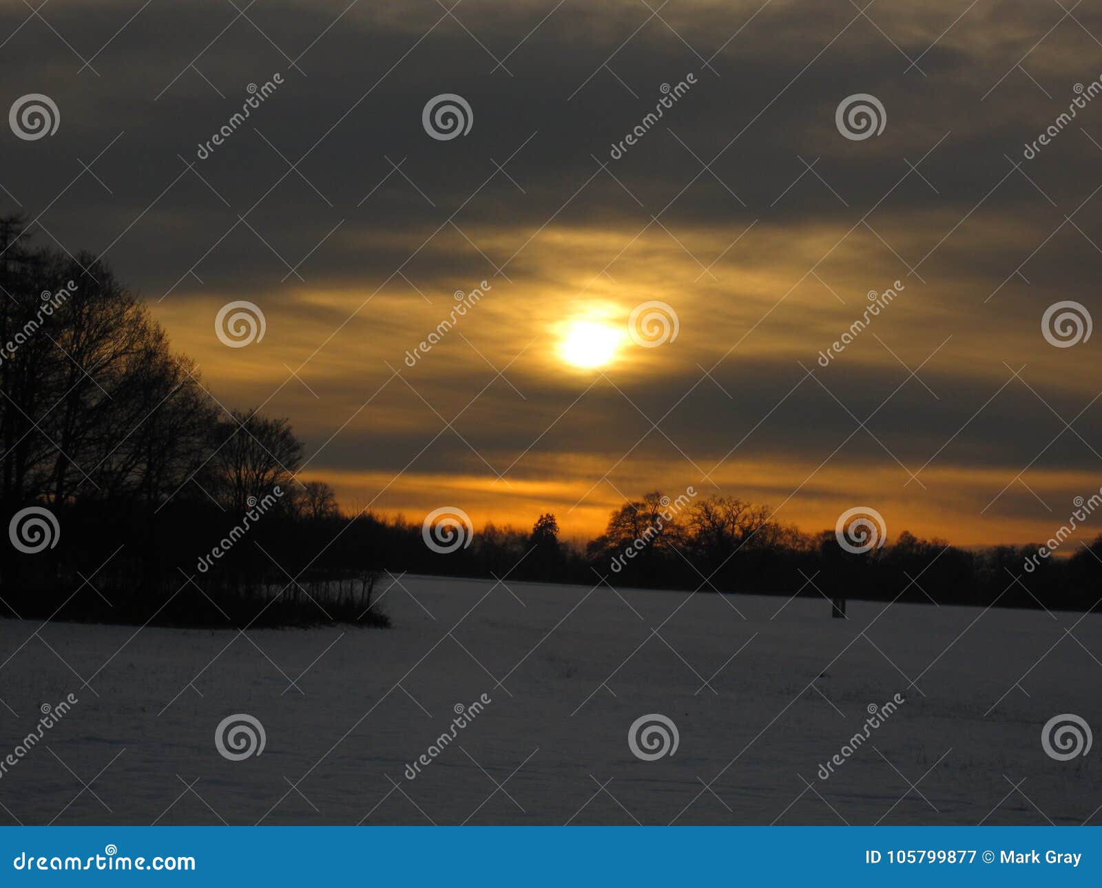 Bitterly Cold Sunset stock image. Image of setting, winter - 105799877