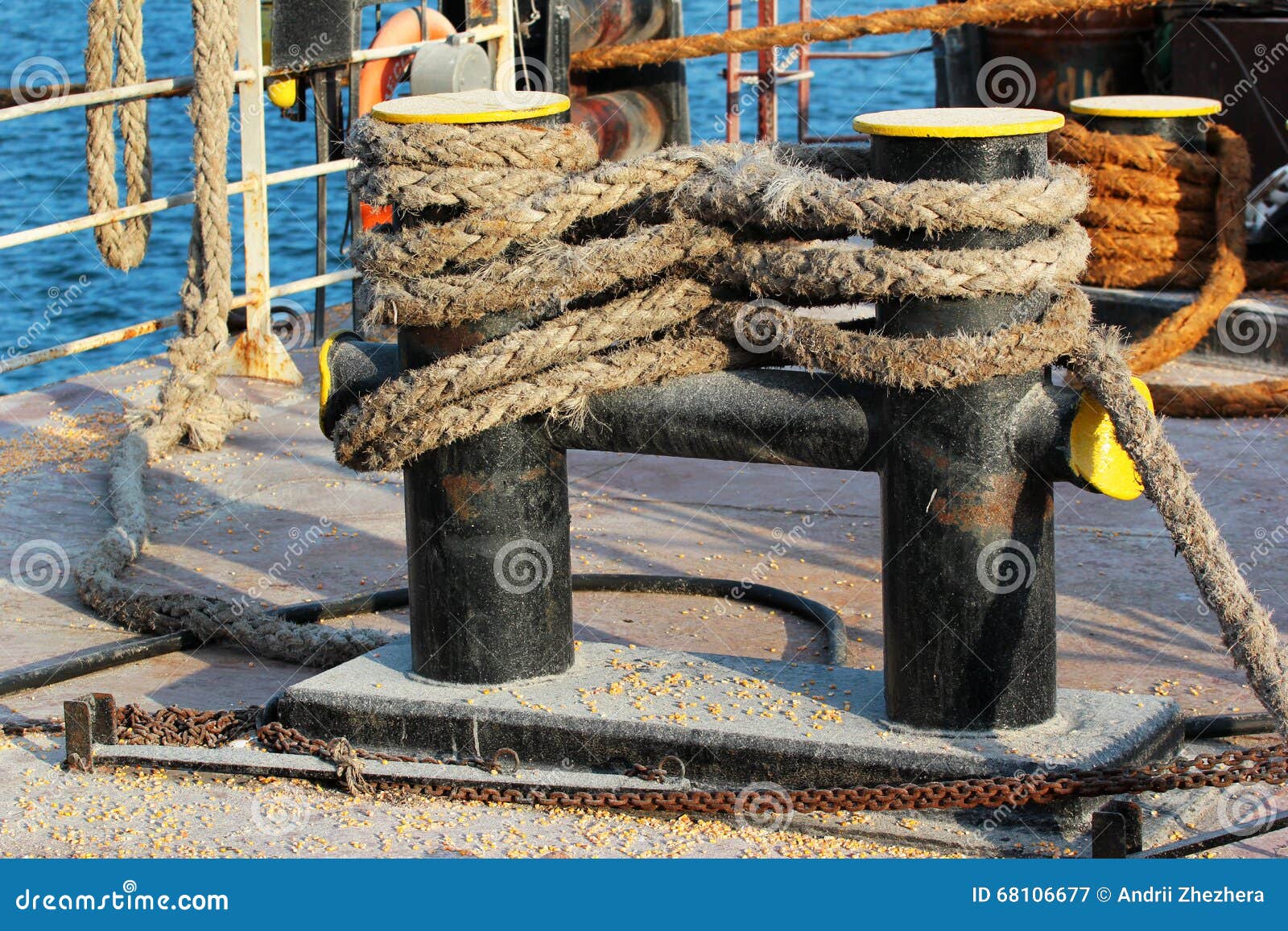 Two Shipboard Bitts And A Yellow Mooring Line From Close Stock Photo ...