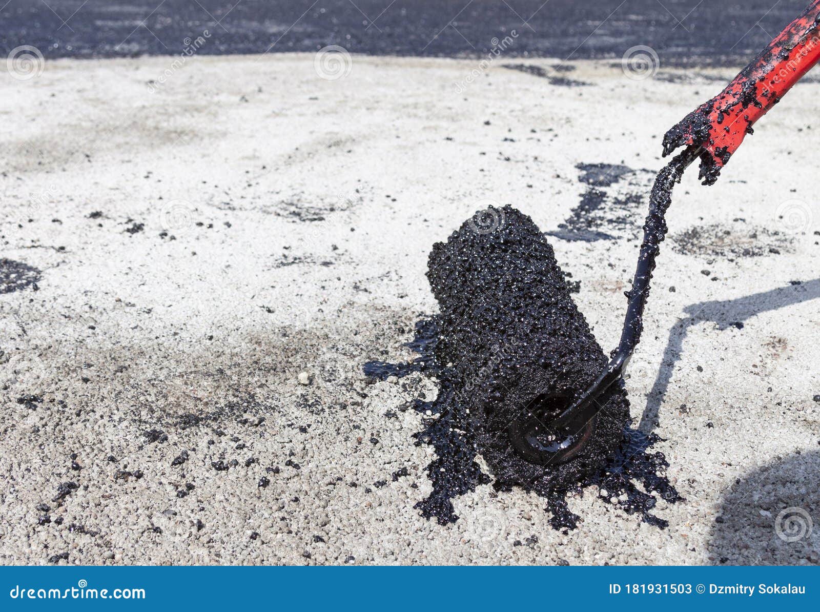 Bitumen on a Concrete Surface with a Roller, Waterproofing. Close-up ...
