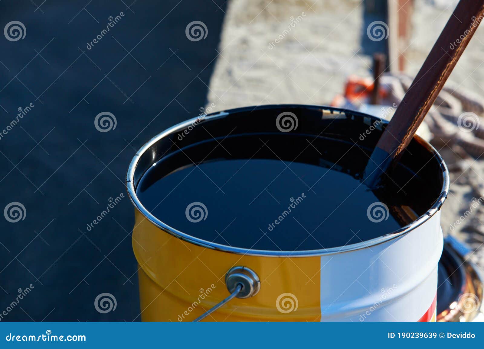 Bitumen in a metal barrel stock image. Image of covering - 190239639