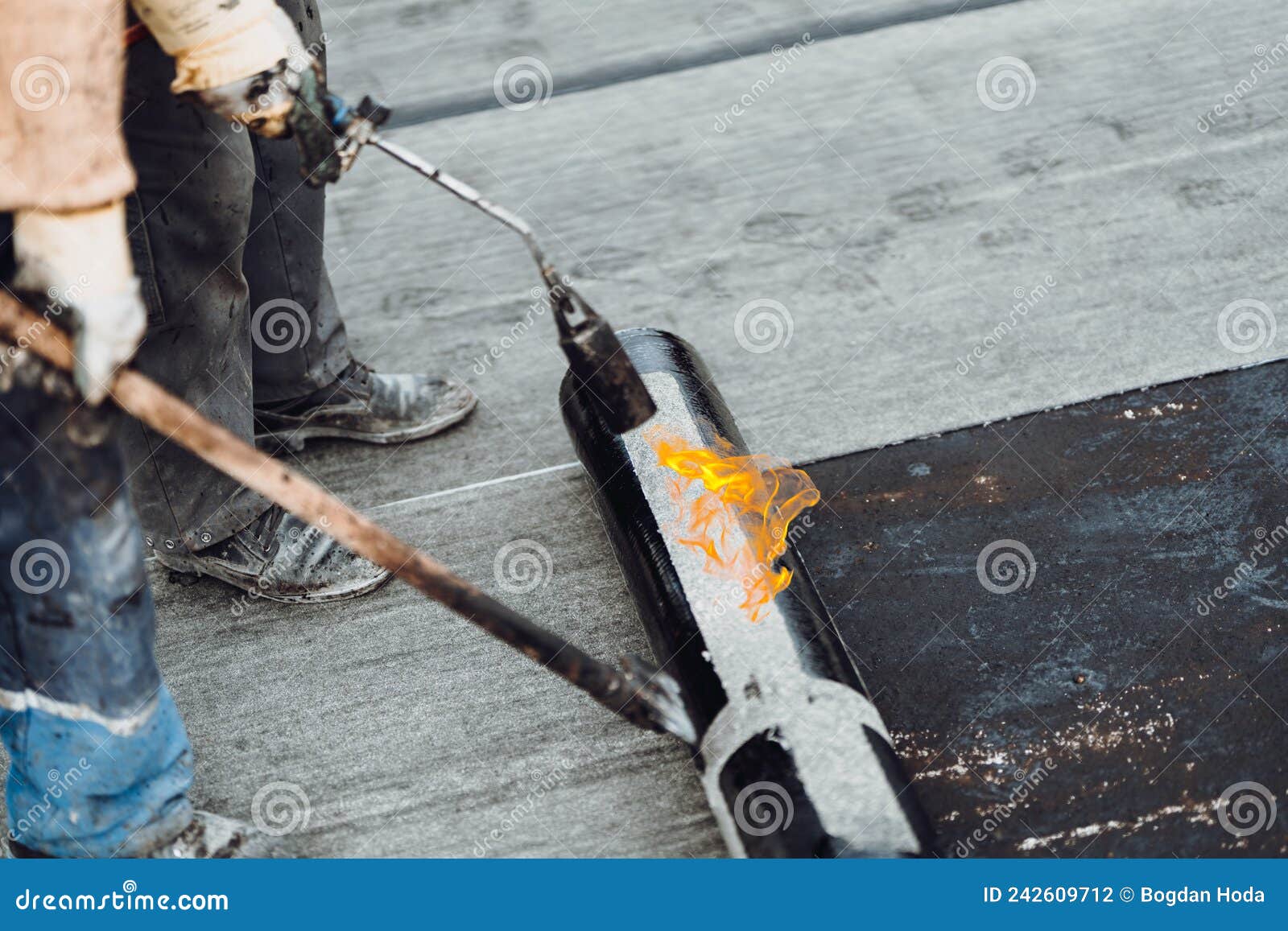 Professional Construction Worker Installing and Waterproofing House ...