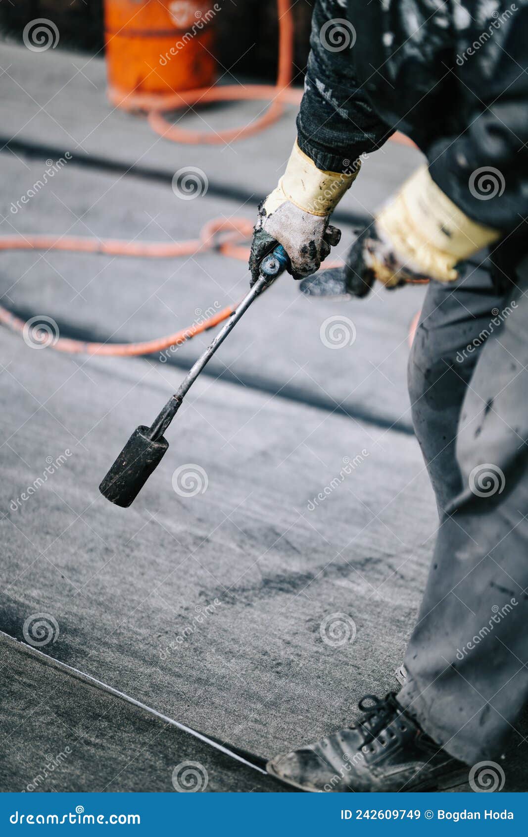 Professional Construction Worker Installing and Waterproofing House ...