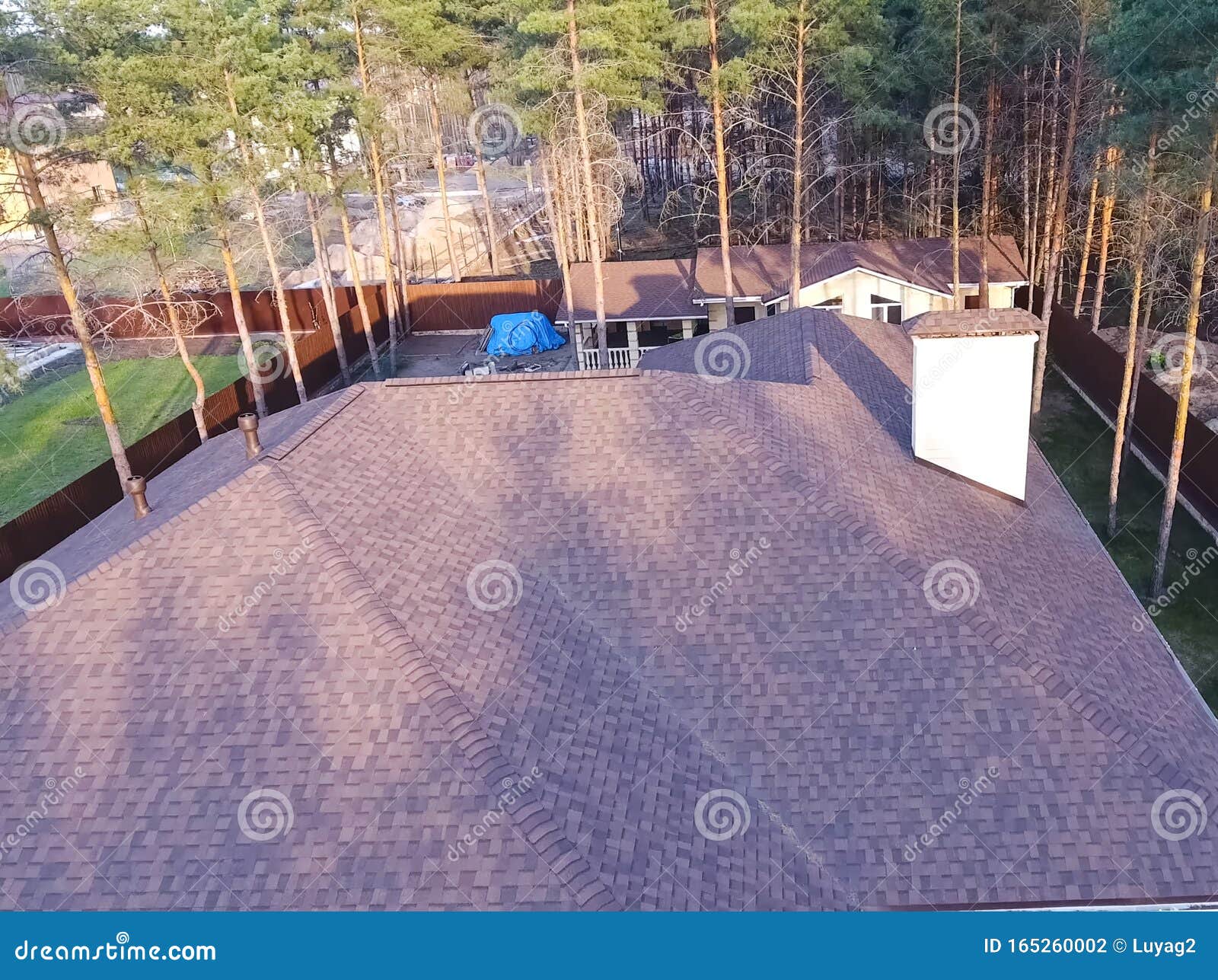 Bituminous Tile for a Roof. House with a Roof from a Bituminous Stock ...