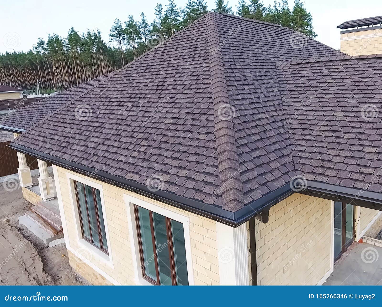 Bituminous Tile for a Roof. House with a Roof from a Bituminous Stock ...