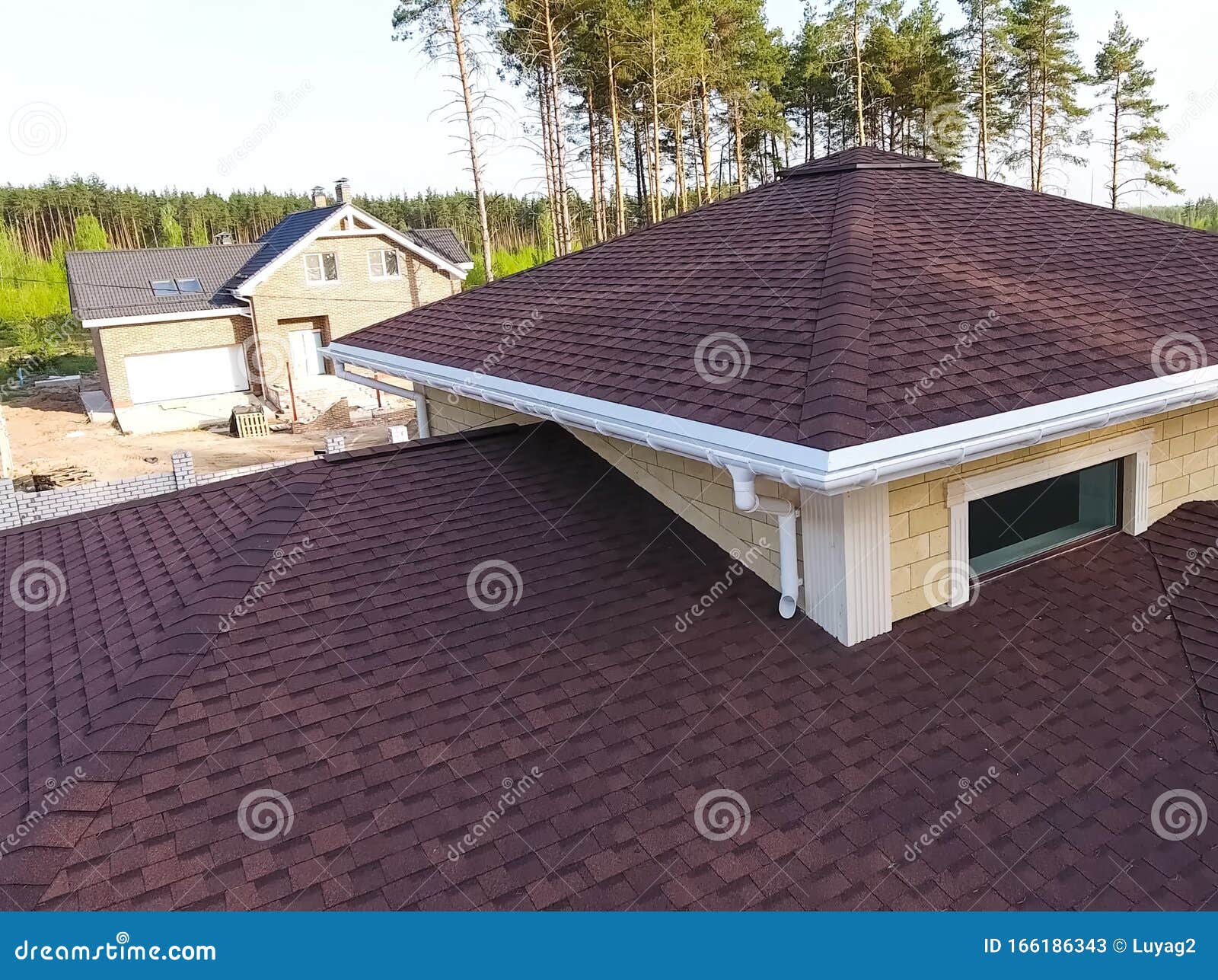Bituminous Tile for a Roof. House with a Roof from a Bituminous Stock ...