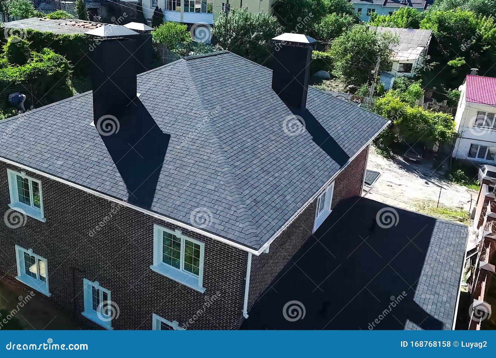 Bituminous Tile for a Roof. House with a Roof from a Bituminous Stock ...