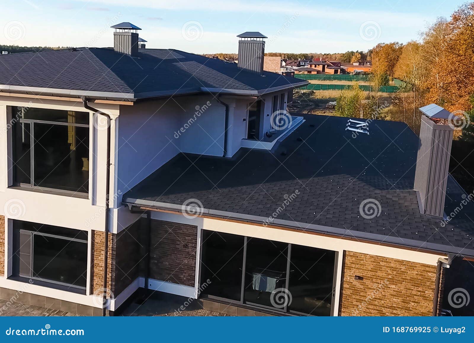 Bituminous Tile for a Roof. House with a Roof from a Bituminous Stock ...