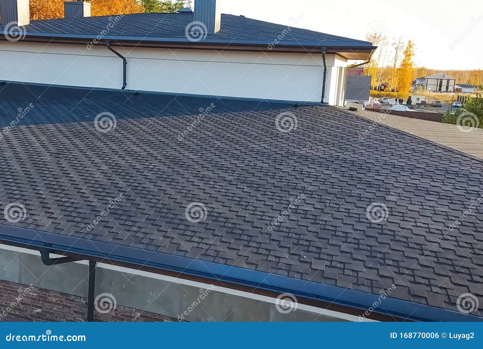 Bituminous Tile for a Roof. House with a Roof from a Bituminous Stock ...