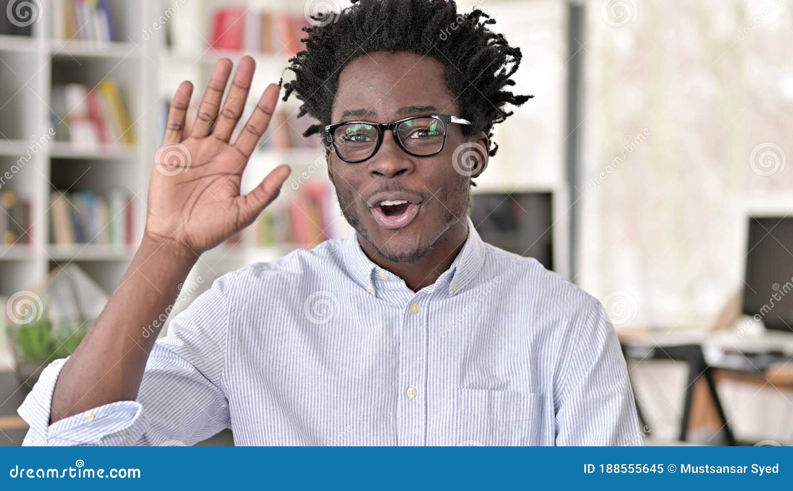 Young African Man Waving, Saying Hello Stock Image - Image of trader ...