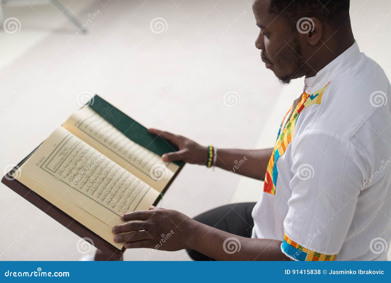 African Muslim Man is Reading the Koran Stock Photo - Image of person ...