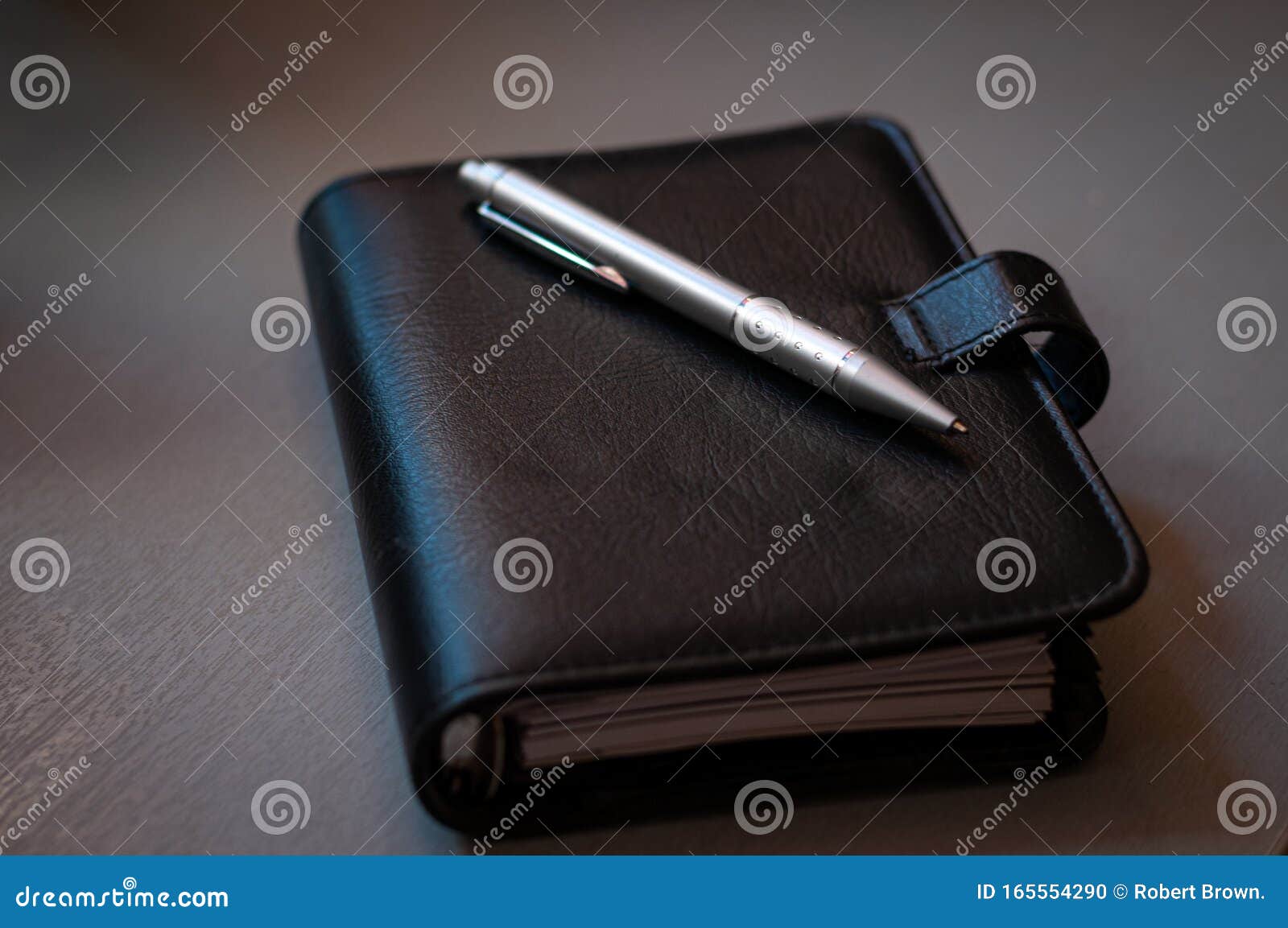 Black Agenda and Pen on Office Table Stock Photo - Image of object ...