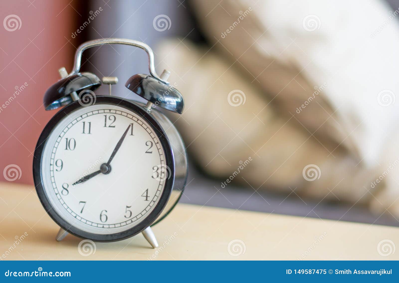 Black Alarm Clock on the Wooden Table beside the Bed Stock Image ...