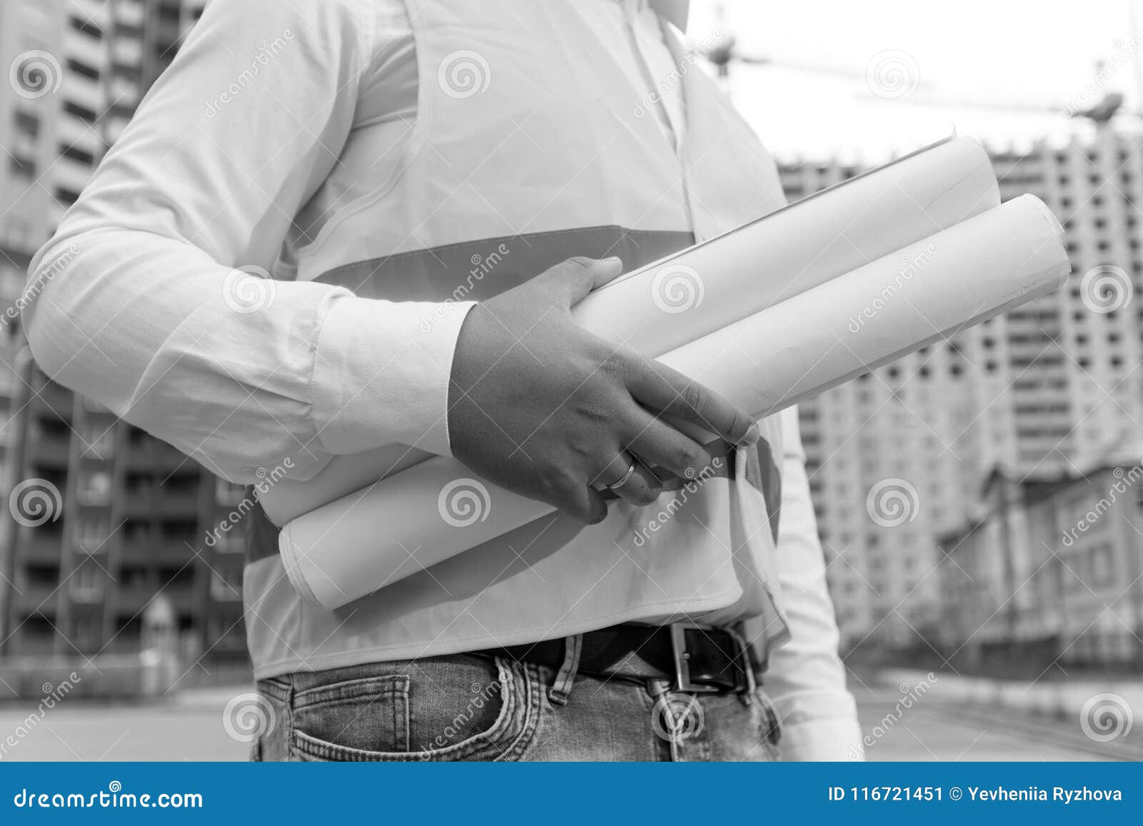 Black Adn White Image of Male Architect Holding Blueprints of New House ... Black Adn White Image of Male Architect Holding Blueprints of New House ...