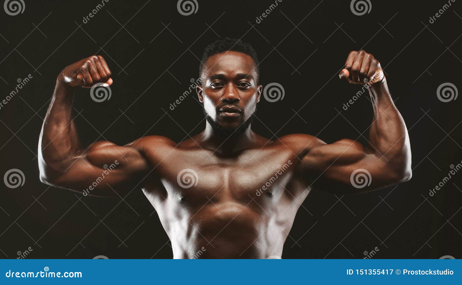 Black Athlete Flexing Muscles, Demonstrating Strong Biceps Stock Image ...