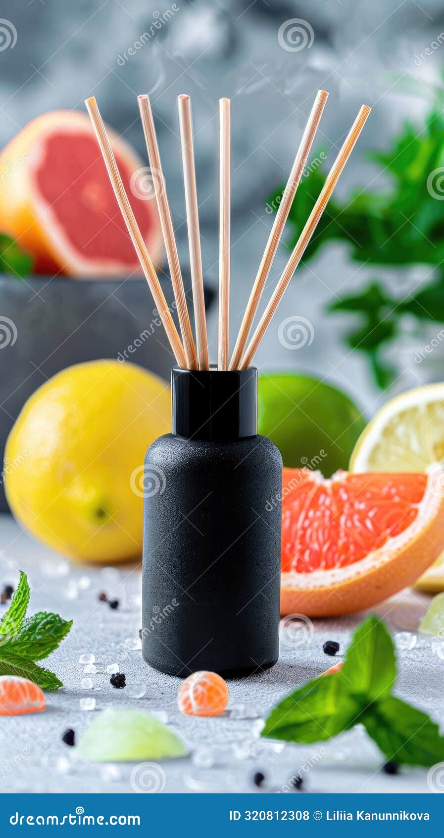 Black Background with Reed Diffusers Uniquely and Citrus Fruit on Stone ...
