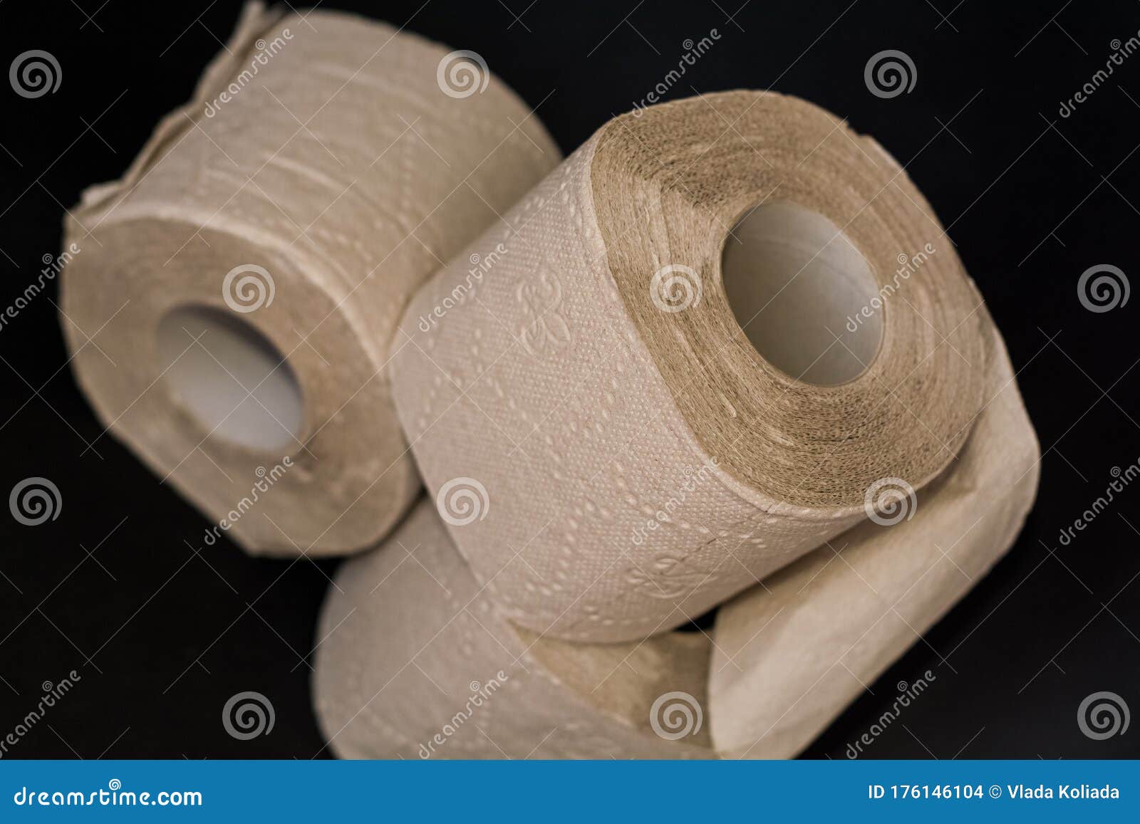 On Black Background, Three Piles of Grey Open Toilet Paper. Stock Photo ...