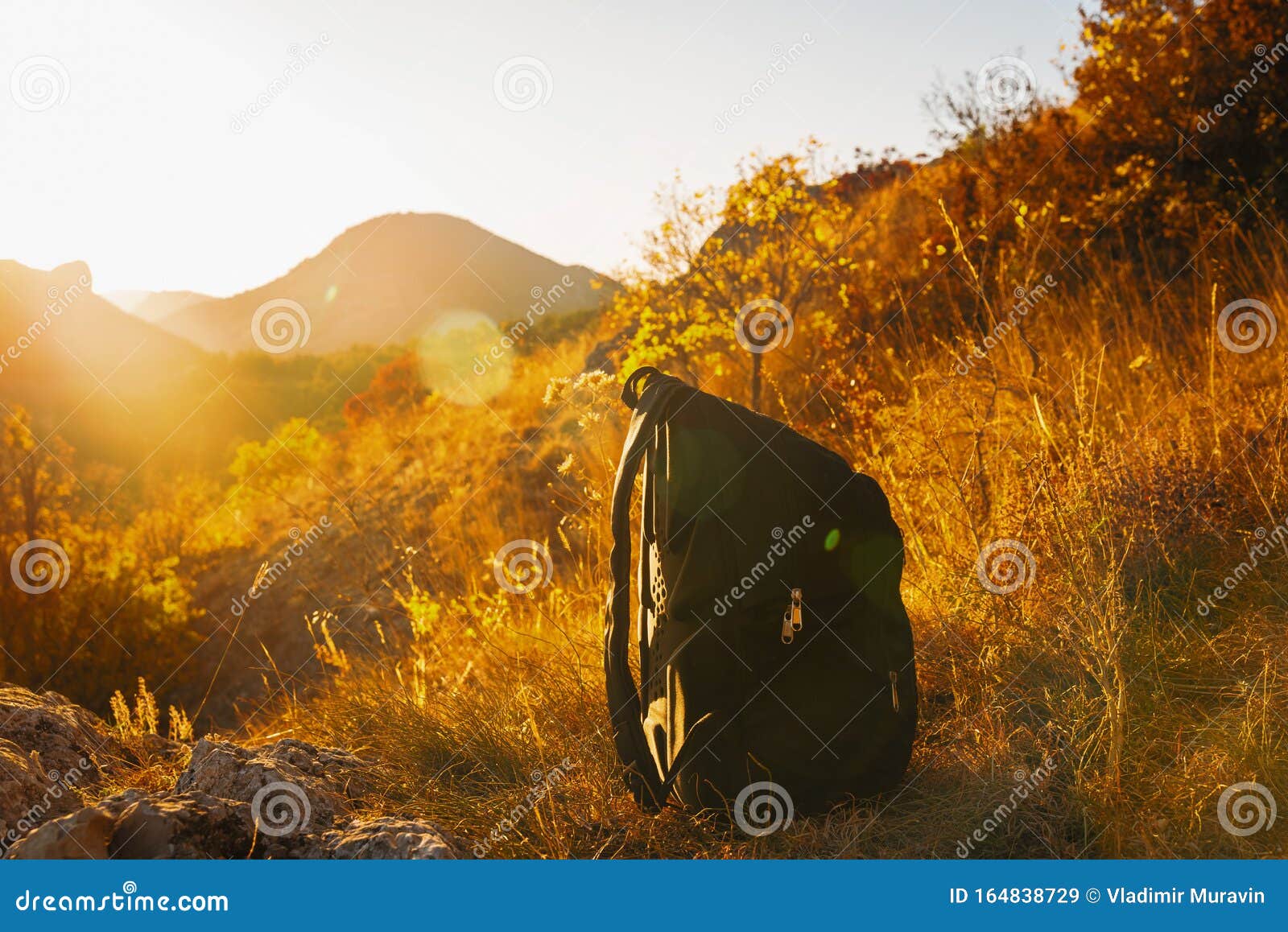 Black Backpack in the Mountains at Sunset Stock Image - Image of sport ...