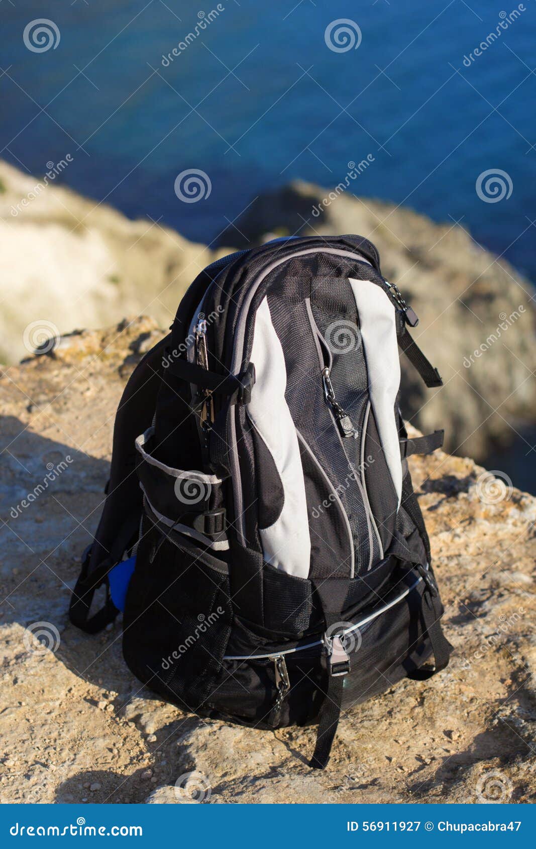 Black Backpack on the Rock Peak Stock Image - Image of hike, trek: 56911927