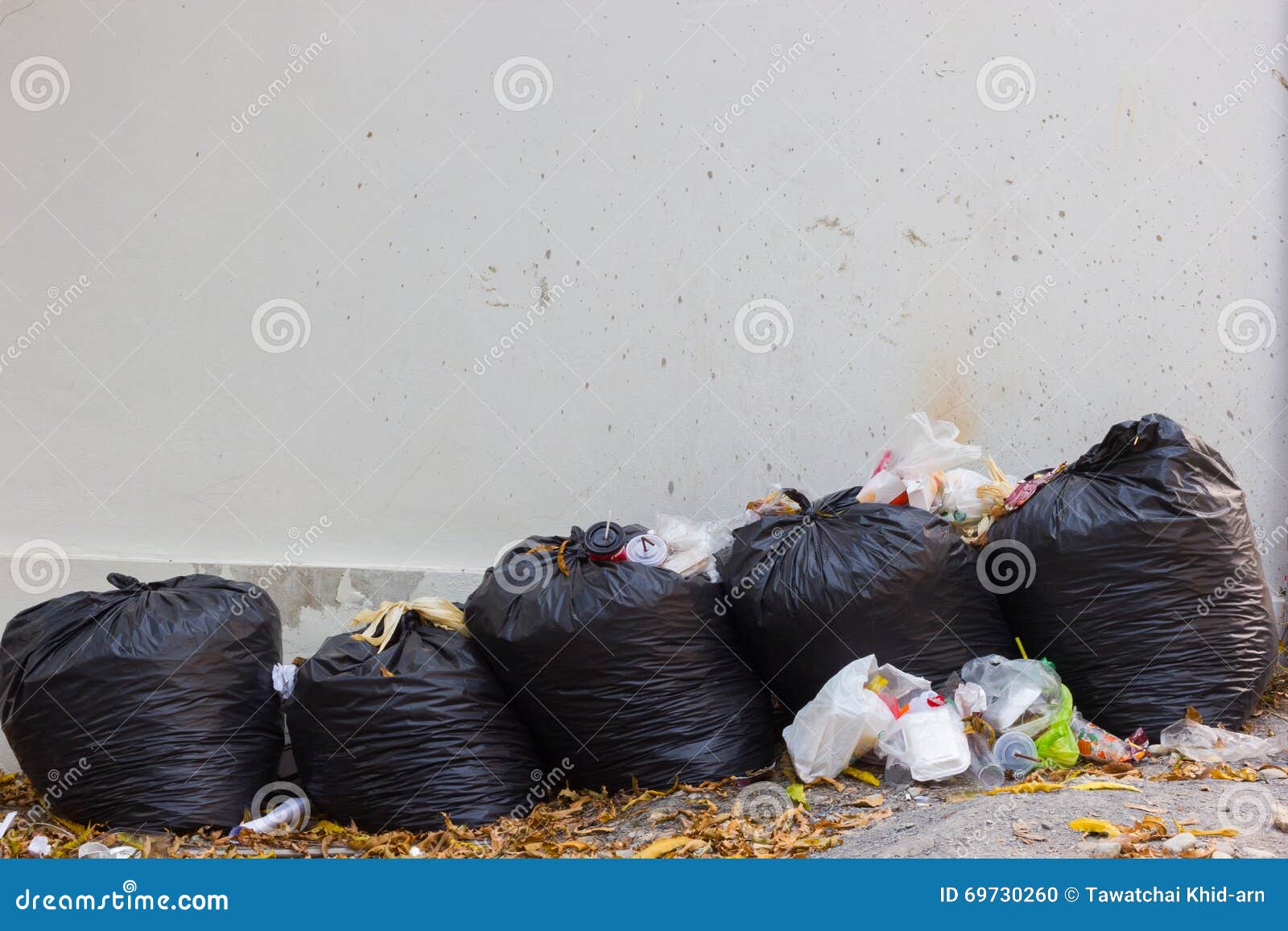 Black Bags of Garbage and Waiste on Blank Dirty Wall. Stock Photo ...